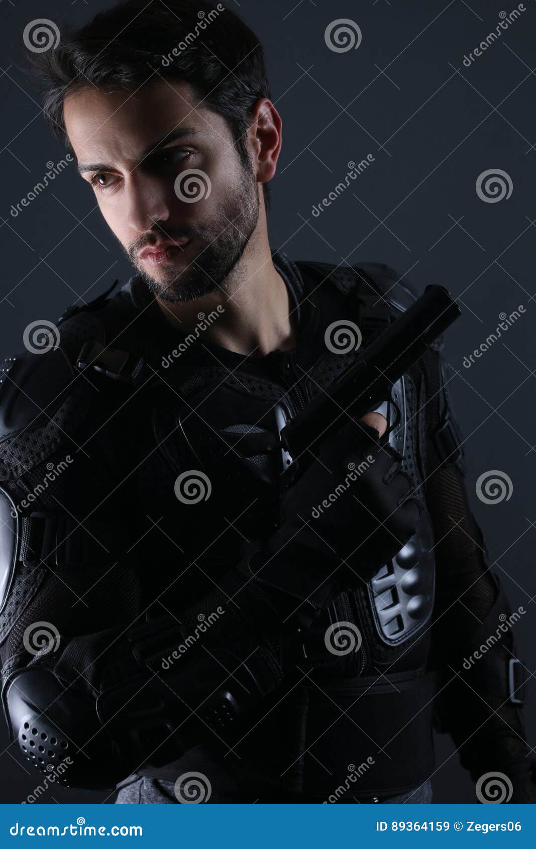 Super Cops - Handsome Policeman Holding a Gun Stock Image - Image of ...