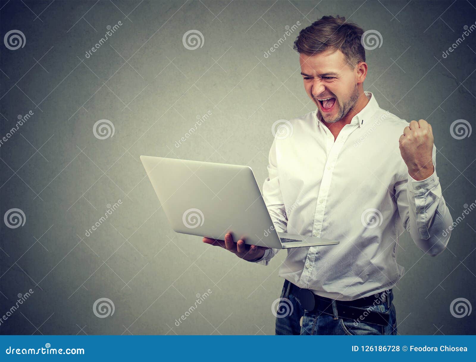Super Excited Young Man with Laptop Computer Stock Photo - Image of ... Super Excited Young Man with Laptop Computer Stock Photo - Image of ...