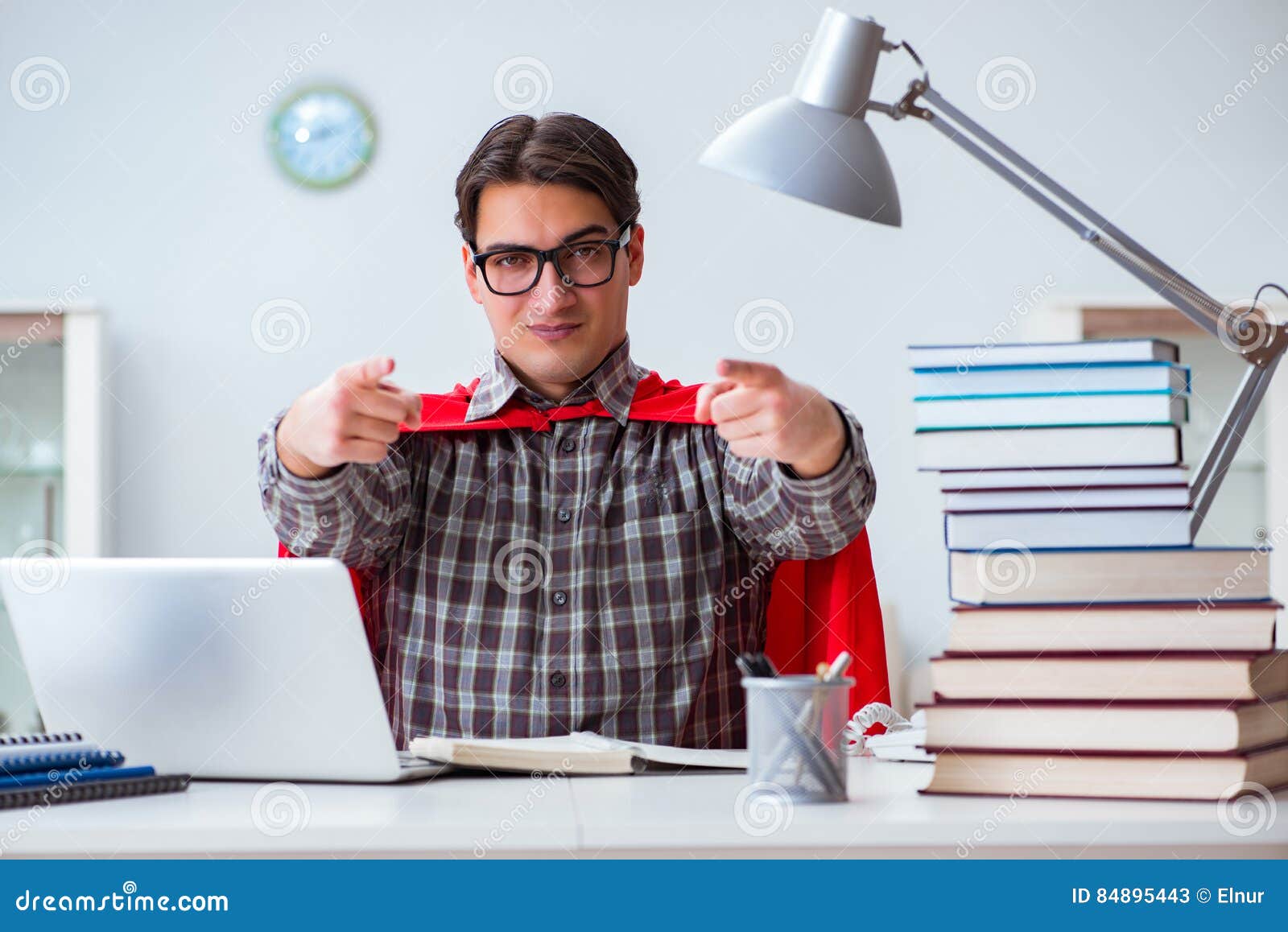 The Super Hero Student with Books Studying for Exams Stock Image ...