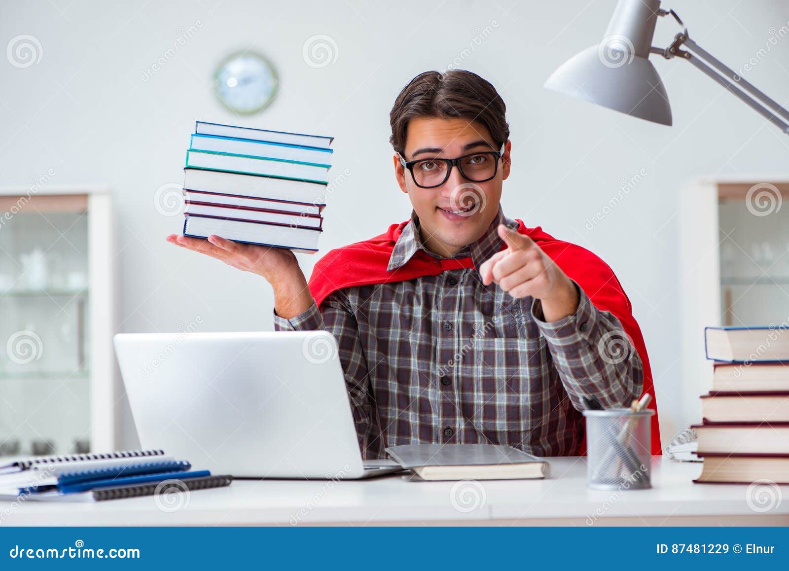 The Super Hero Student with Books Studying for Exams Stock Image ...