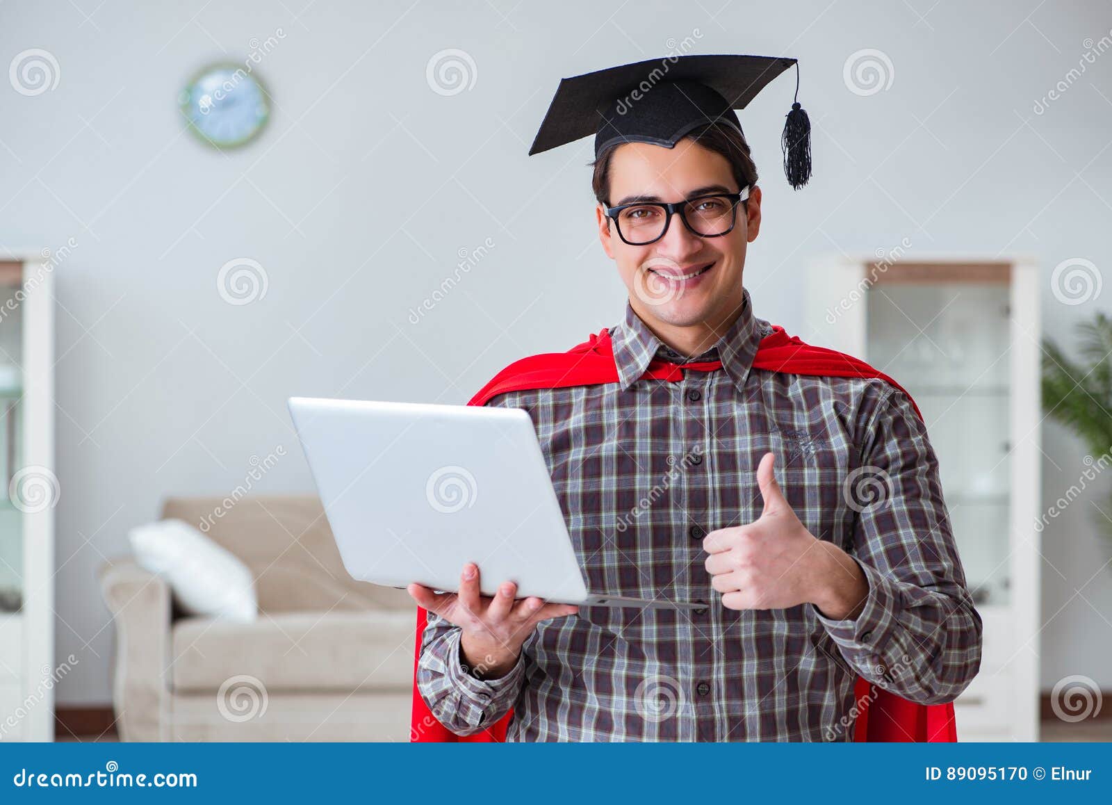 The Super Hero Student with Books Studying for Exams Stock Photo ...