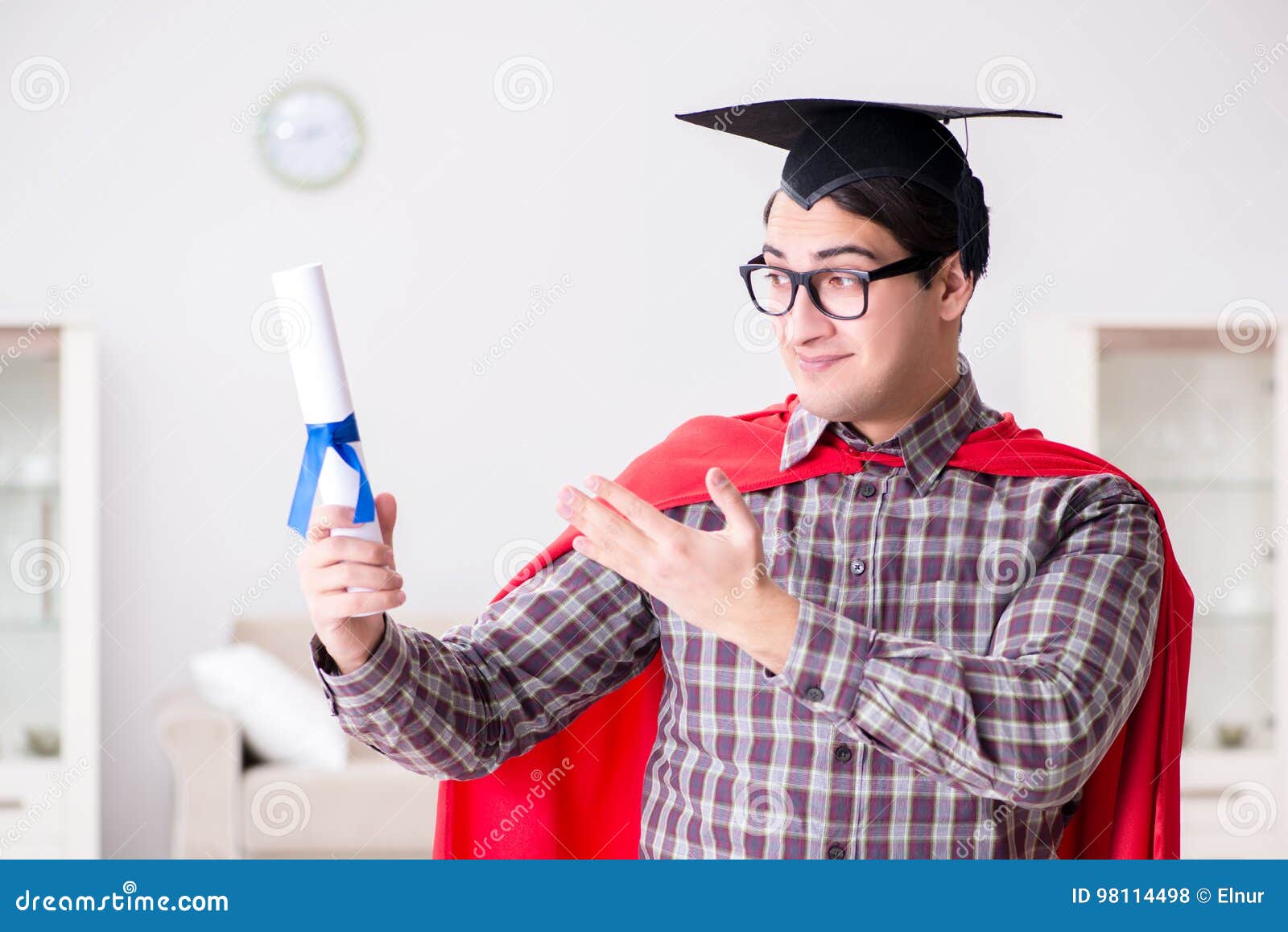 The Super Hero Student Graduating Wearing Mortar Board Cap Stock Photo ...