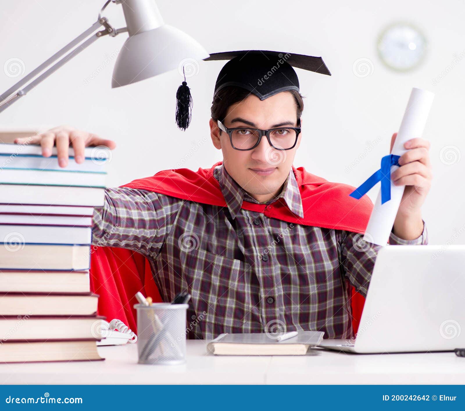 The Super Hero Student Wearing a Mortarboard Studying Stock Photo ...