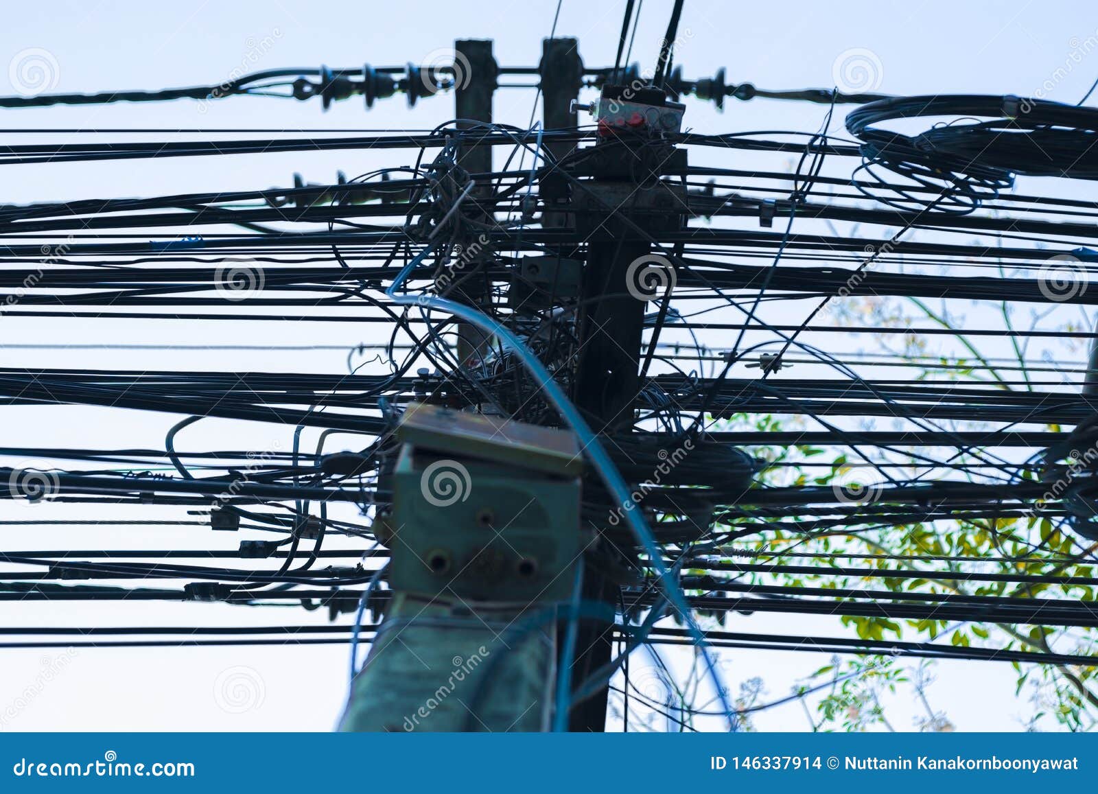 The Mess Electrical Wires With The Blue Sky Background Stock ...