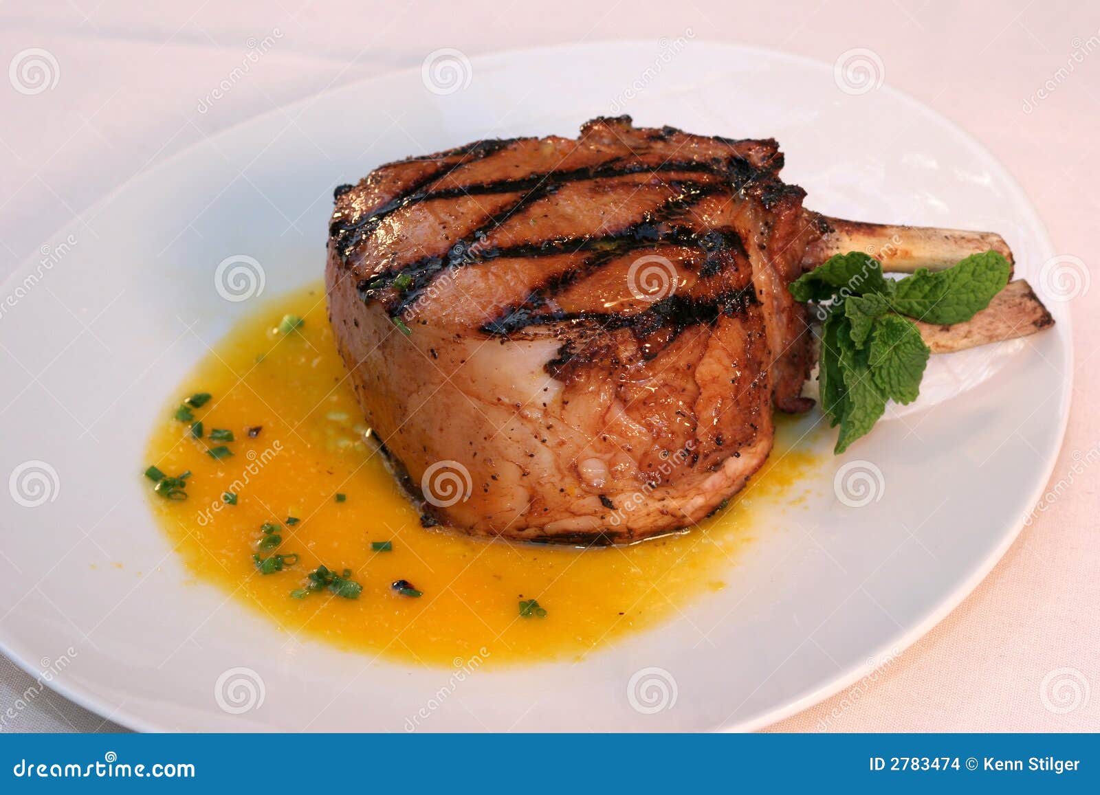 Super Sized Cheeseburger On Table Stock Photo | CartoonDealer.com #65130288