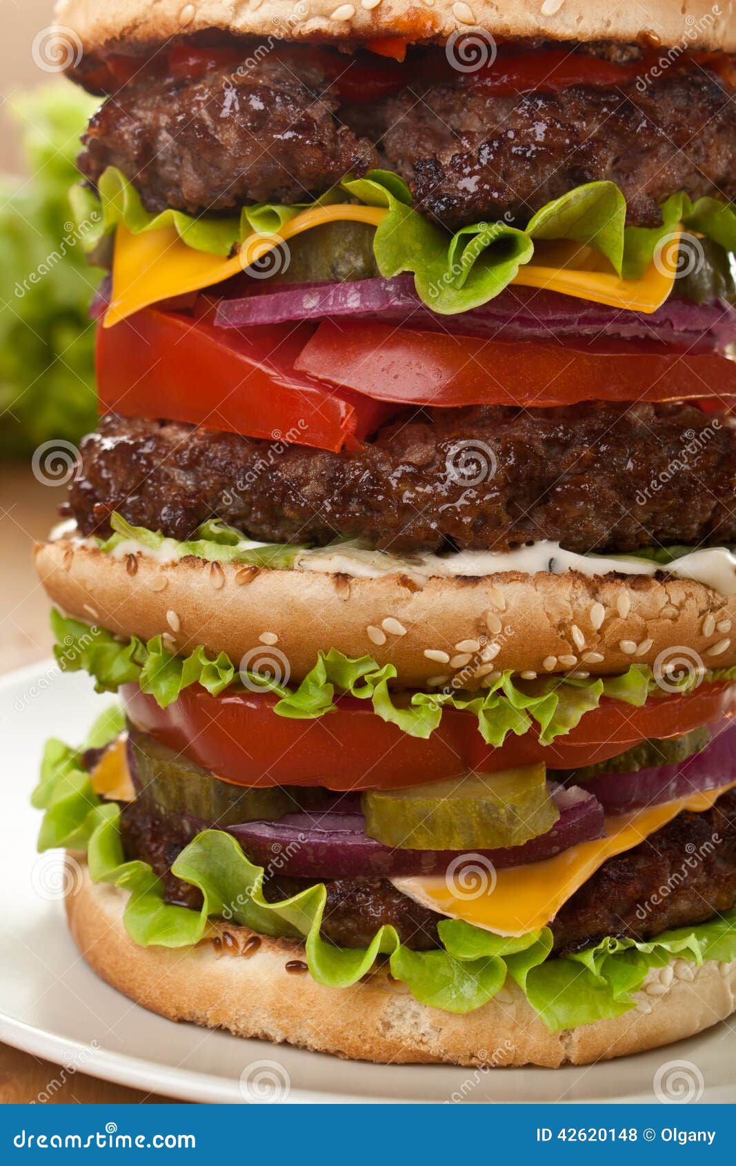 Super Tall Triple Cheeseburger Stock Photo - Image of cheeseburgers ...