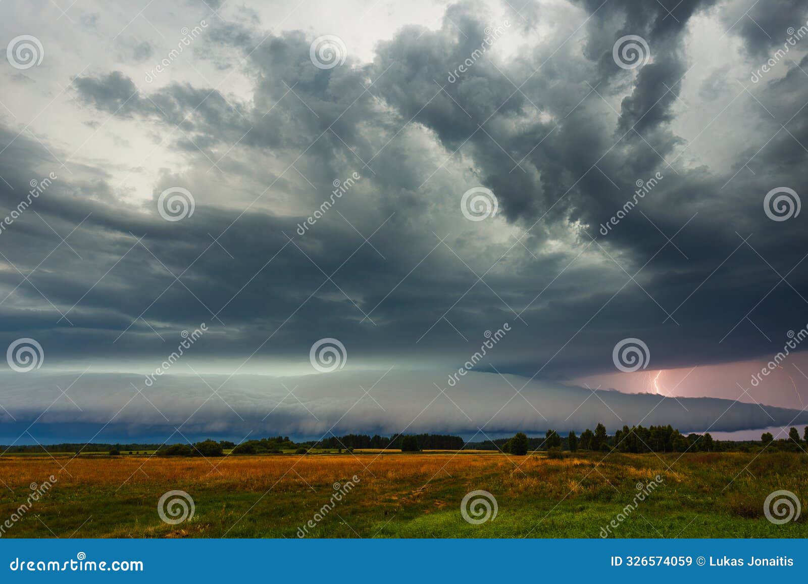 Supercell Cloud with Distant Lightning Illuminating the Storm Structure ...