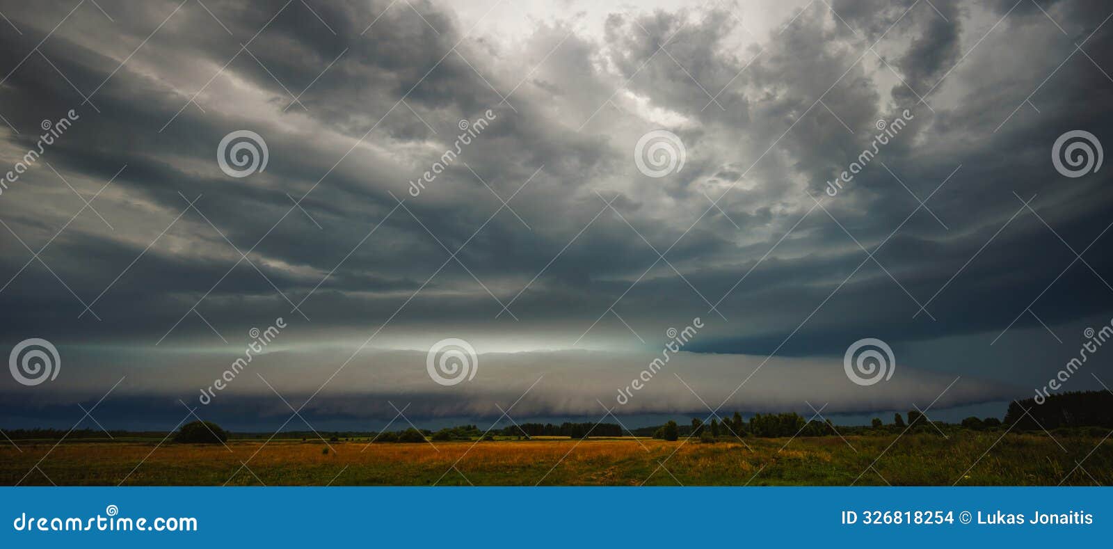 Supercell Cloud with Distant Lightning Illuminating the Storm Structure ...