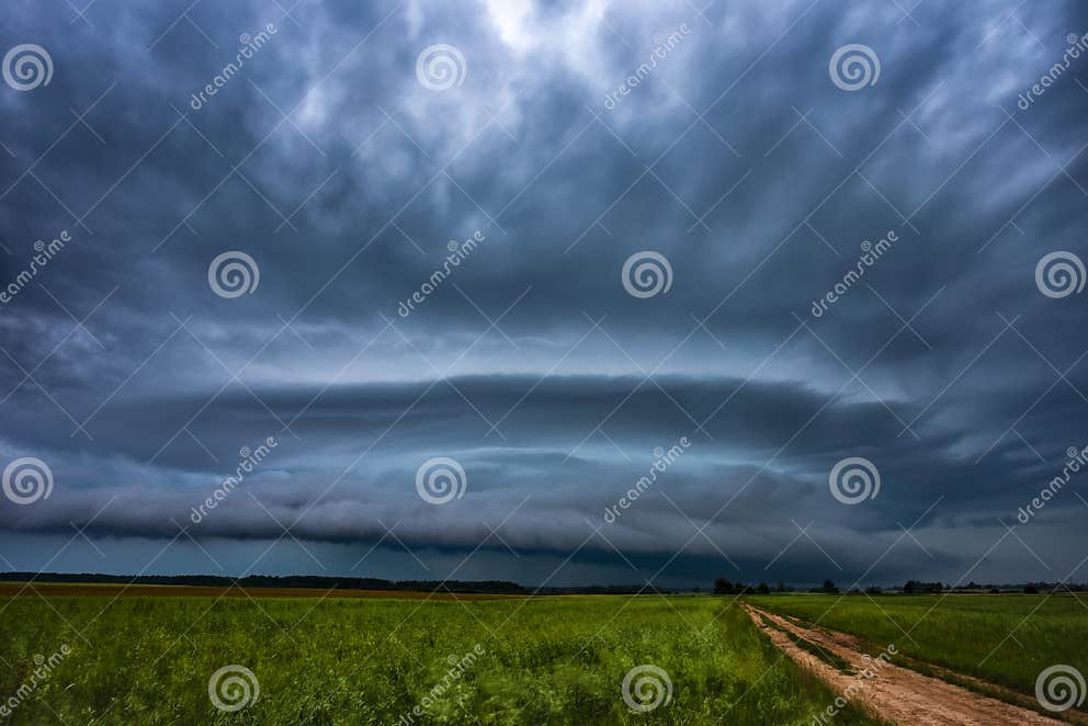 Supercell Storm Clouds with Wall Cloud and Intense Rain Stock Image ...