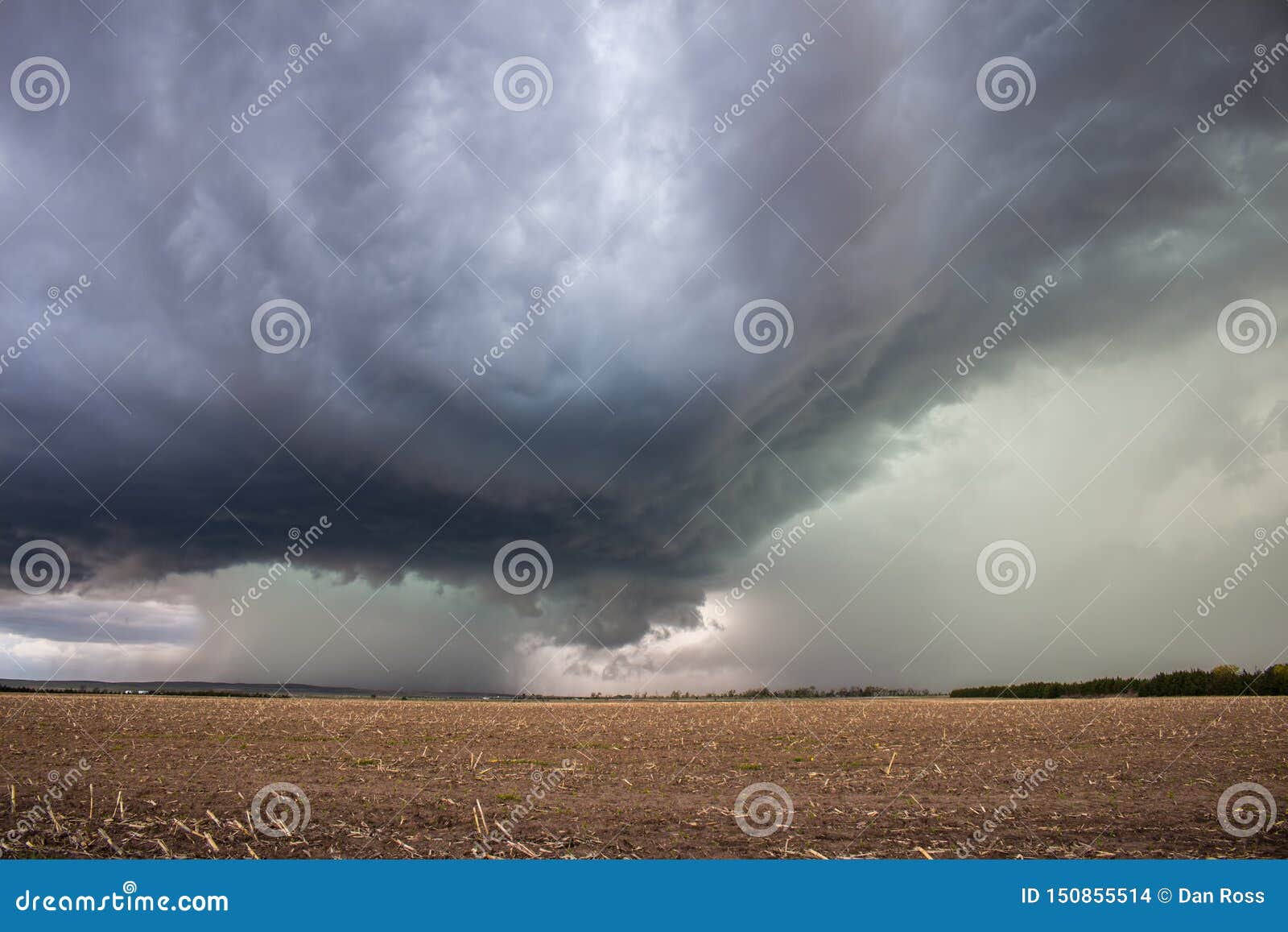 A Supercell Thunderstorm Dumps Heavy Rain and Hail Over a Field. Stock ...