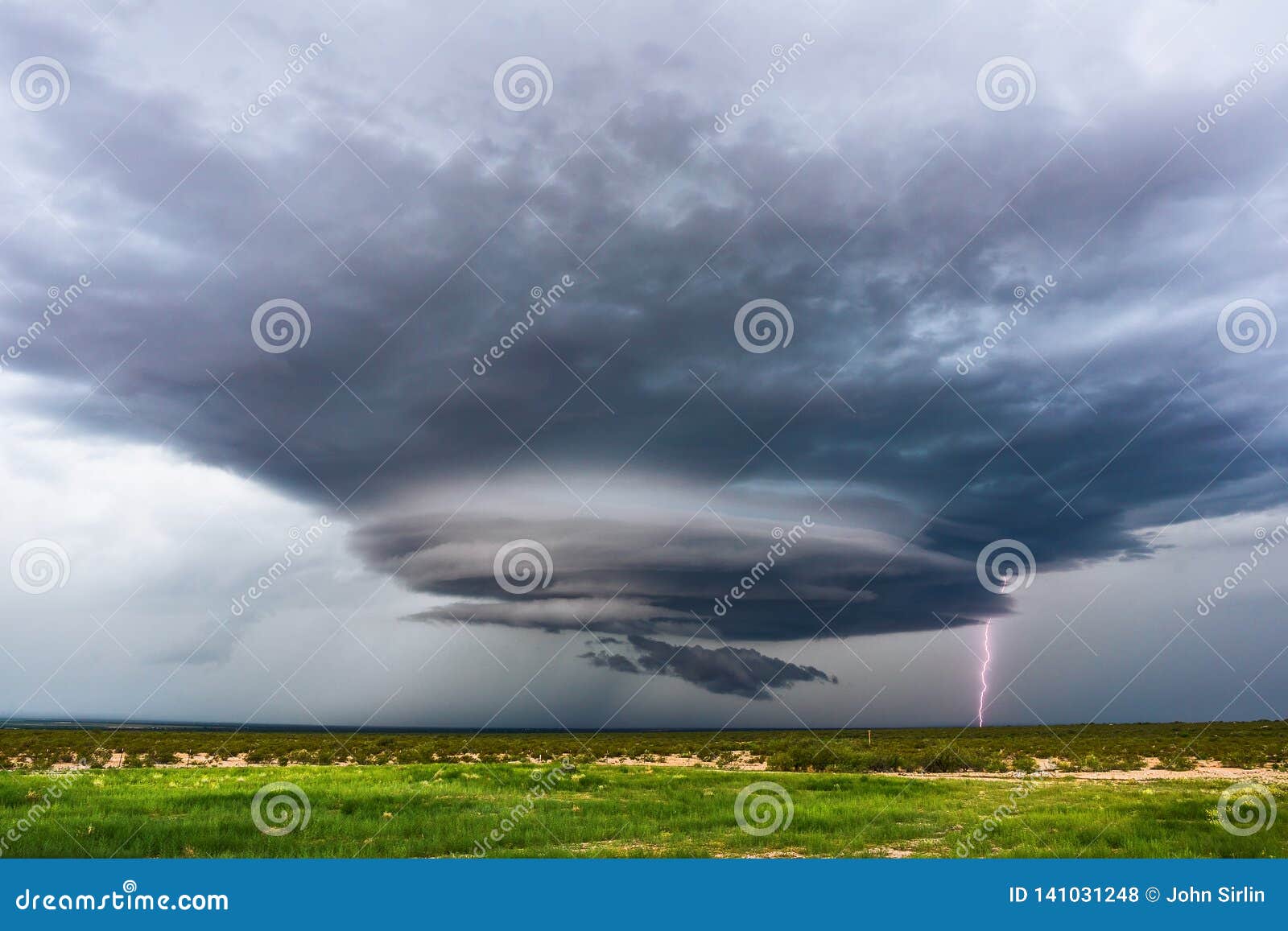 Supercell Thunderstorm with Lightning Bolt. Stock Photo - Image of ...