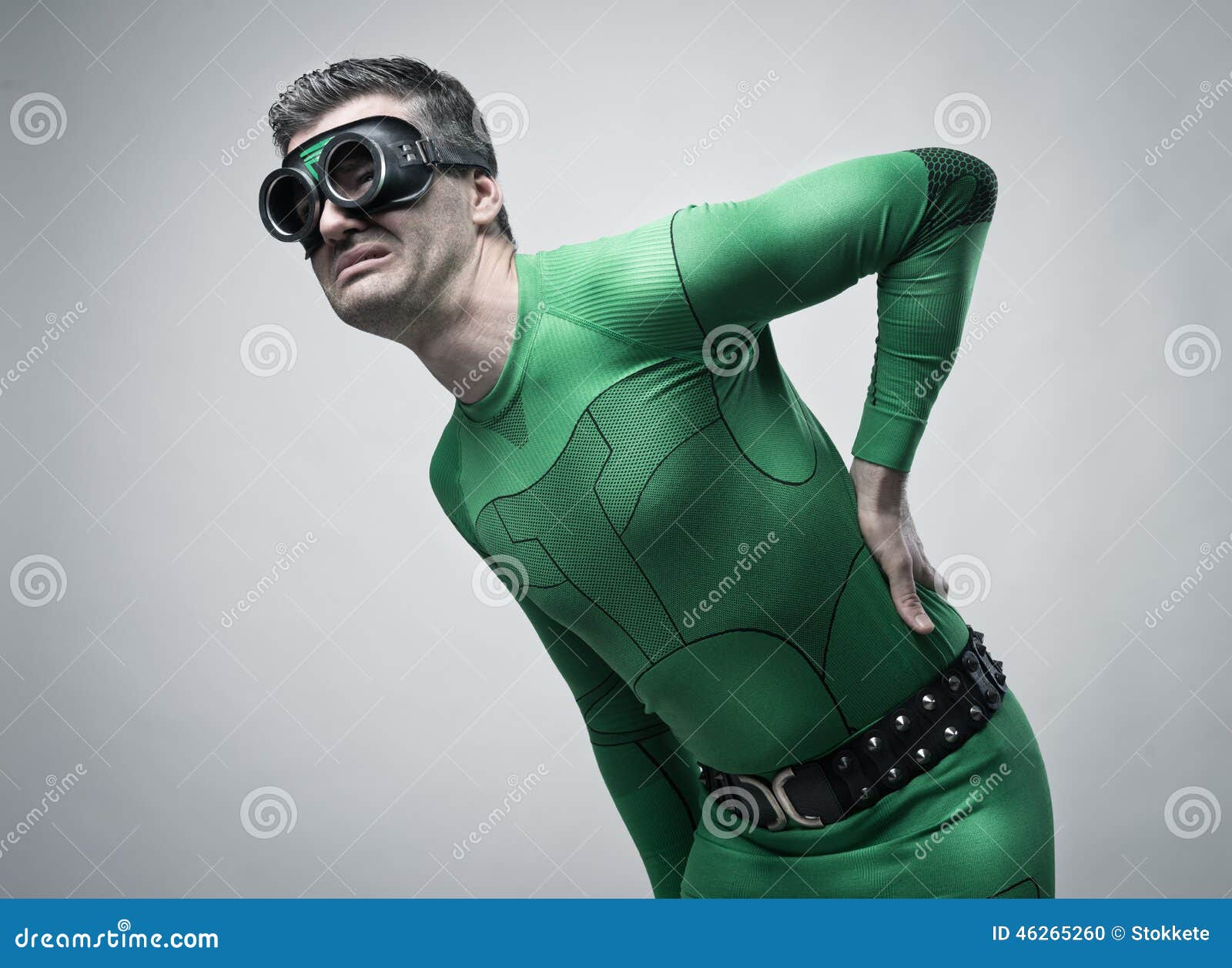 Superhero with back pain stock photo. Image of back, mask - 46265260