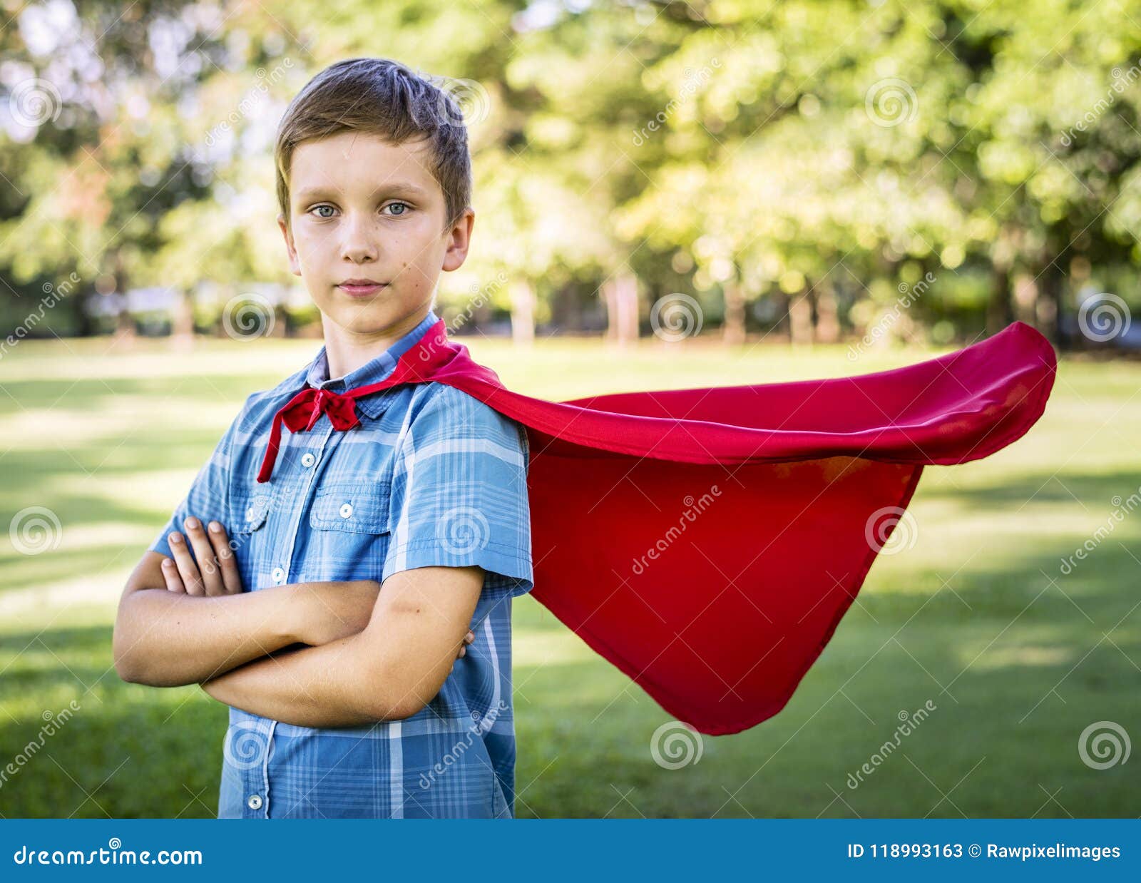 Superhero boy in the park stock image. Image of outside - 118993163