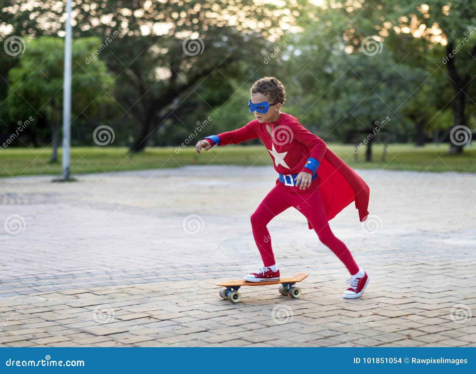 Superhero Boy on a Skateboard Stock Photo - Image of power, playing ...