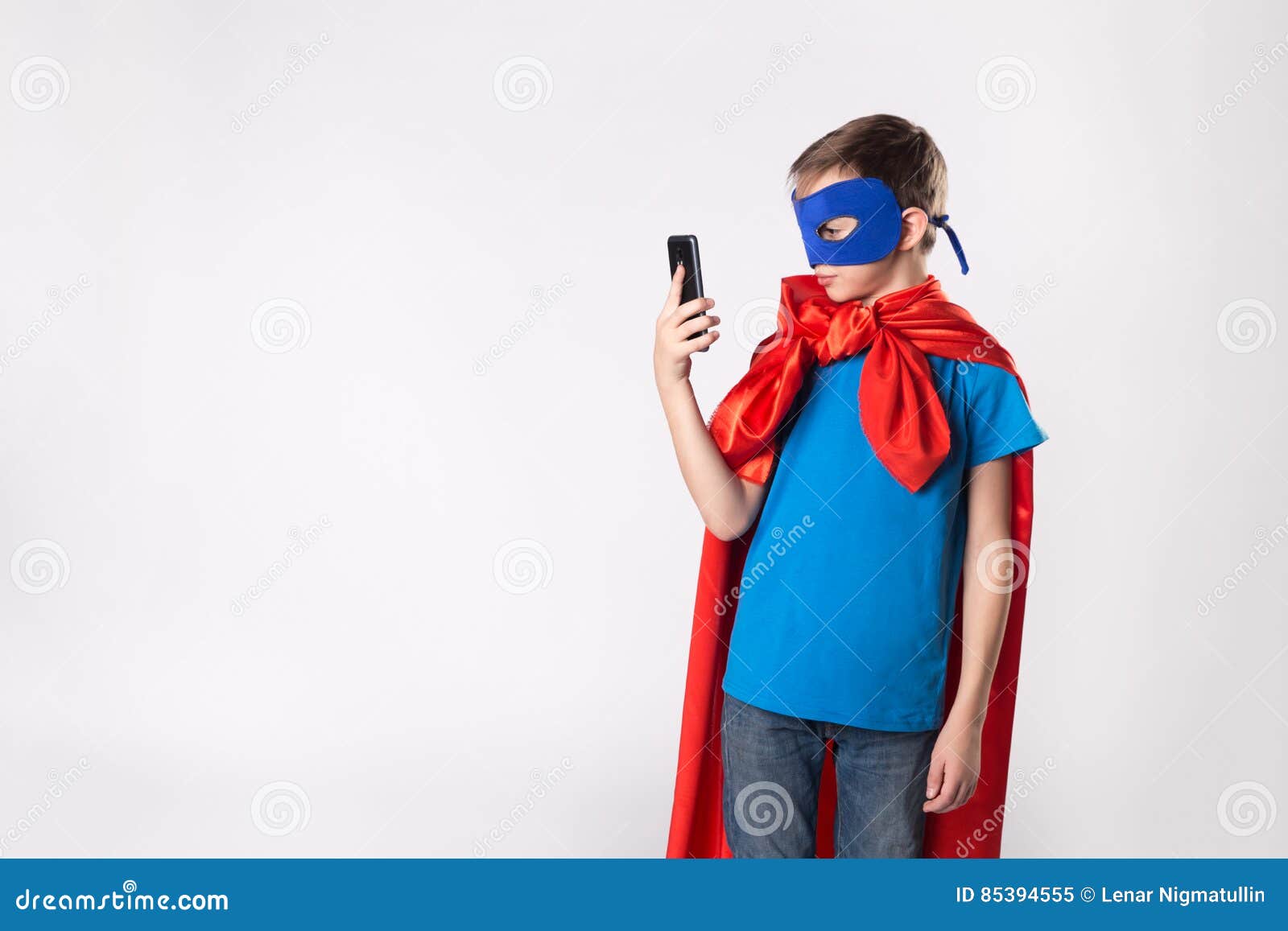 Superhero Child Using Mobile Phone Royalty-Free Stock Photography ...
