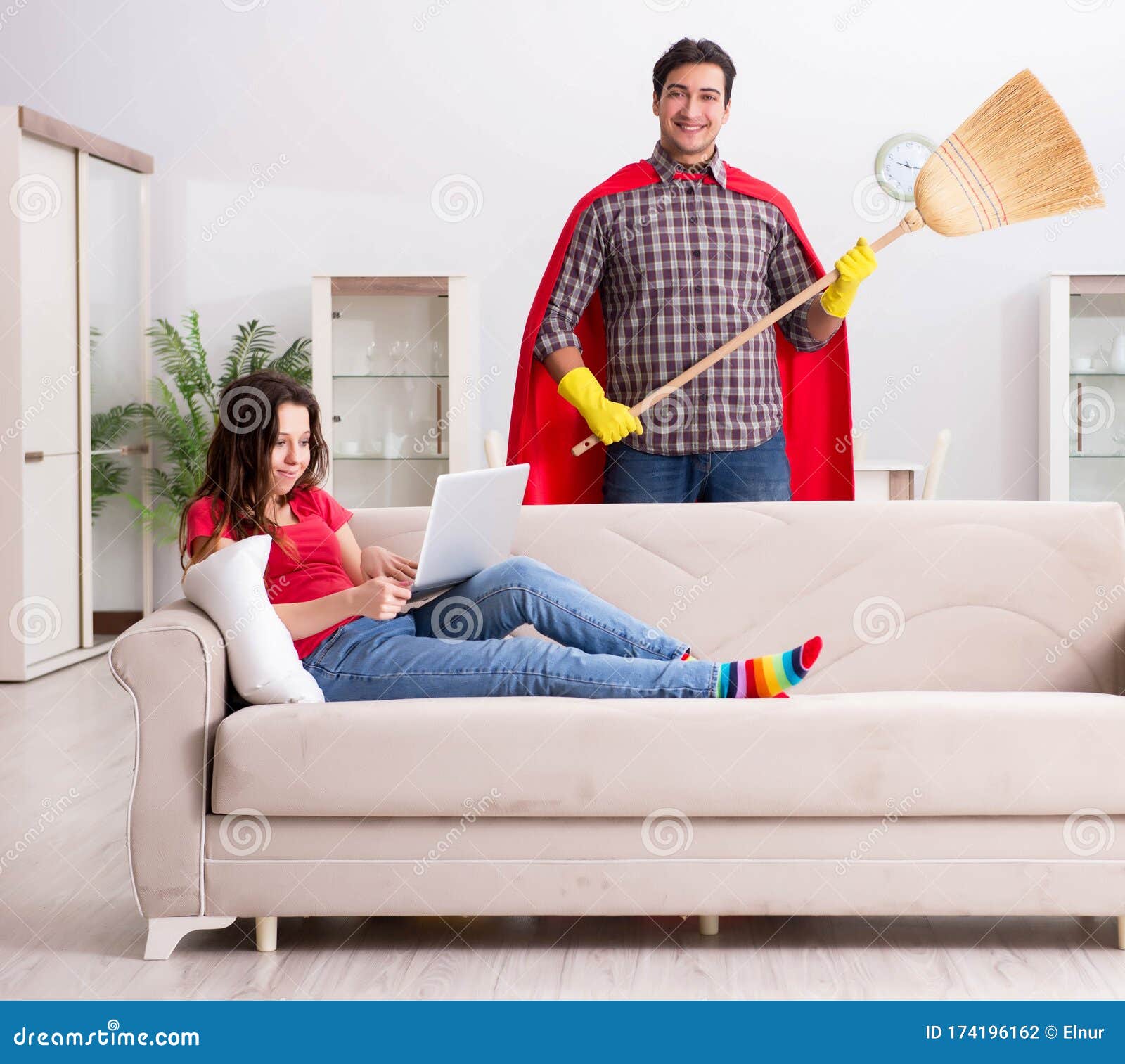 Superhero Husband Helping His Wife at Home Stock Photo - Image of life ...
