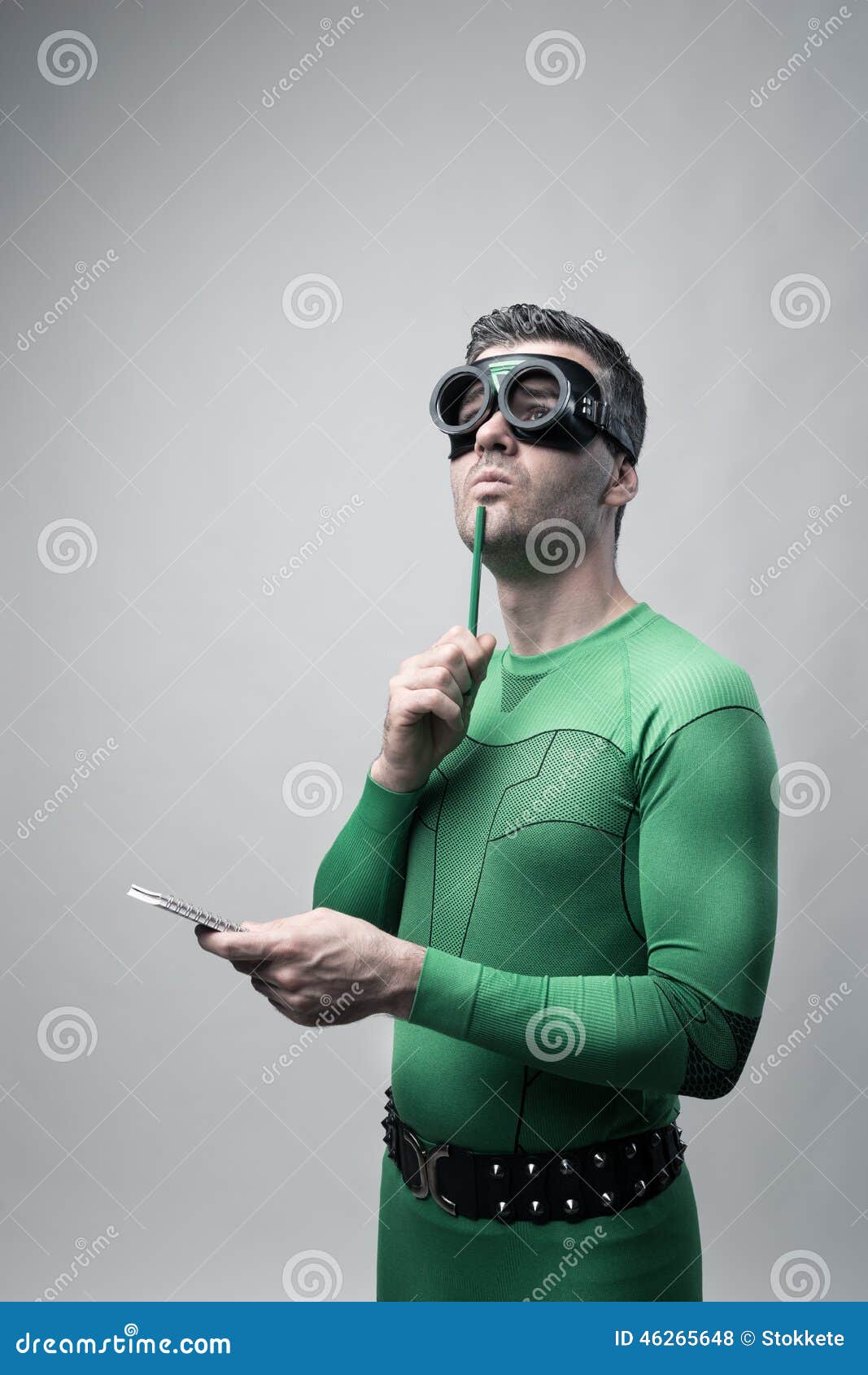 Superhero Thinking with Green Pencil Stock Photo - Image of mask ...