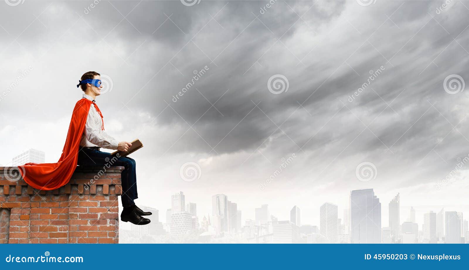 Superman with book stock image. Image of book, hero, hand - 45950203