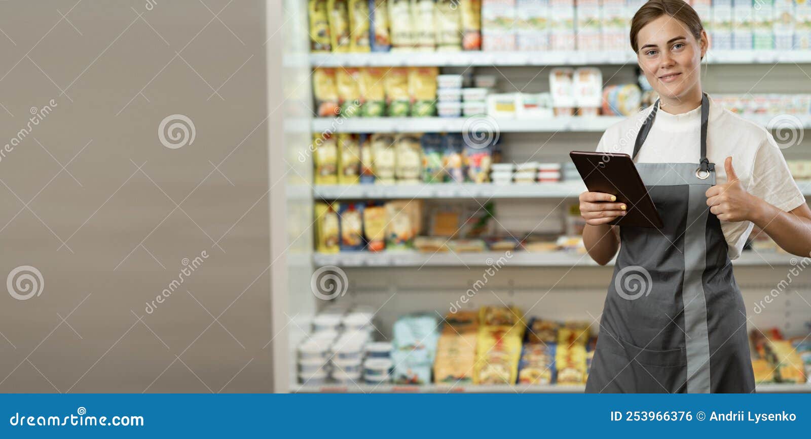 Supermarket Clerk Using Apps on a Digital Tablet, Innovative Technology ...