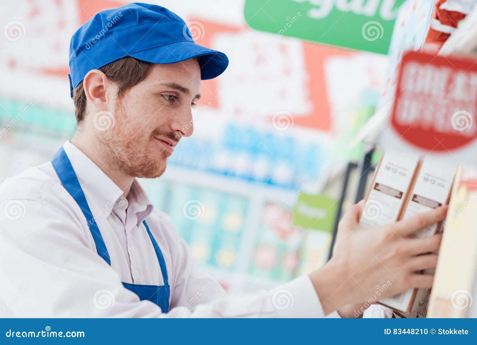 Supermarket clerk at work stock photo. Image of quality - 83448210