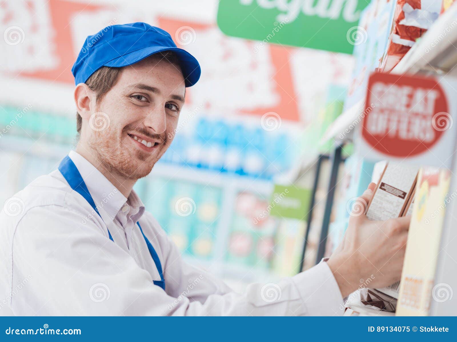 Supermarket clerk at work stock image. Image of staff - 89134075