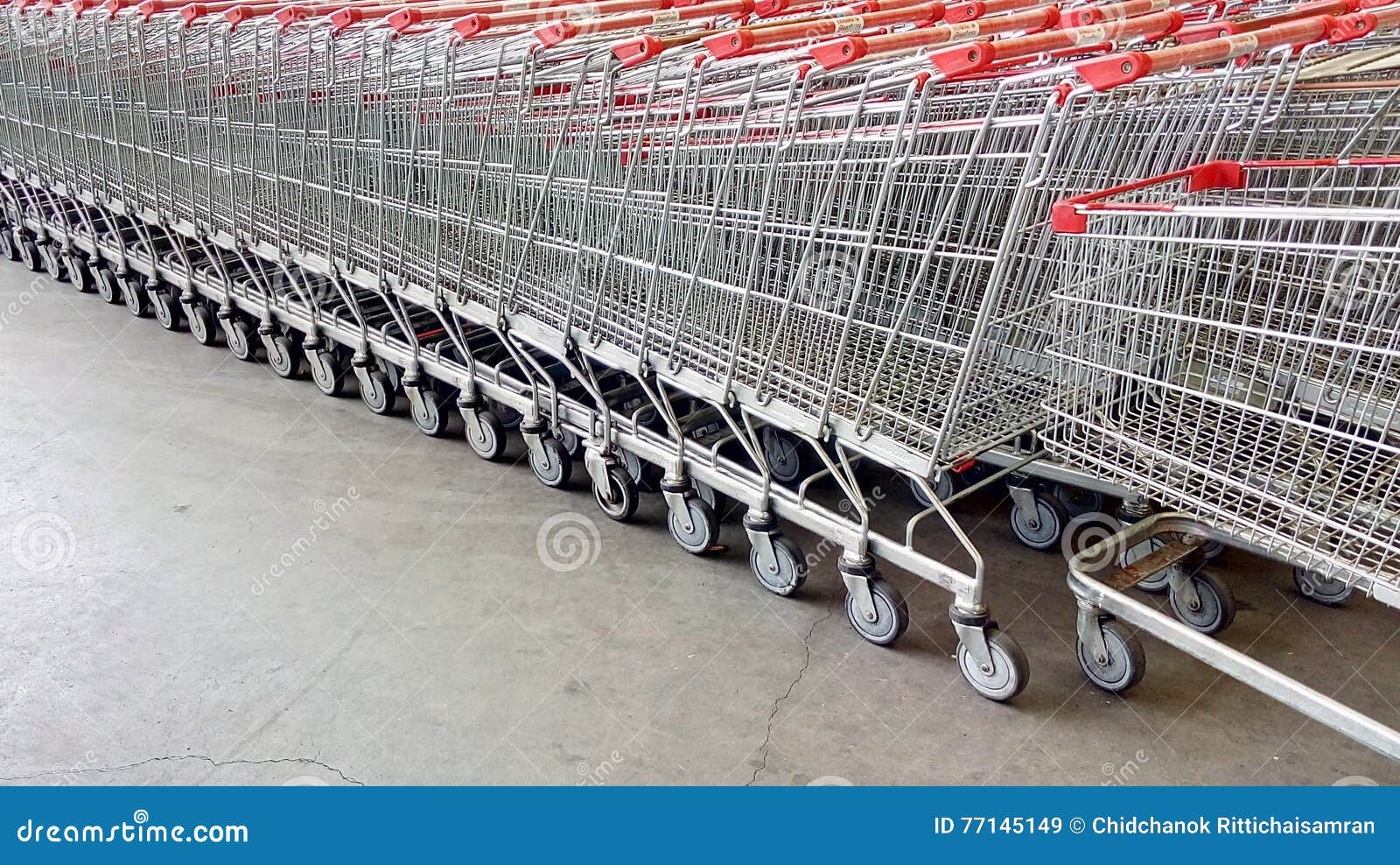 Supermarket trolleys stock image. Image of durable, handle - 77145149