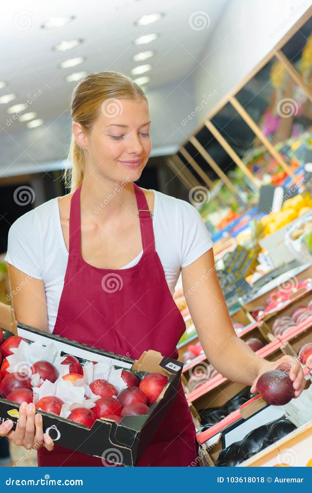 Supermarket Worker in Fruit Aisle Stock Photo - Image of nutritious ...