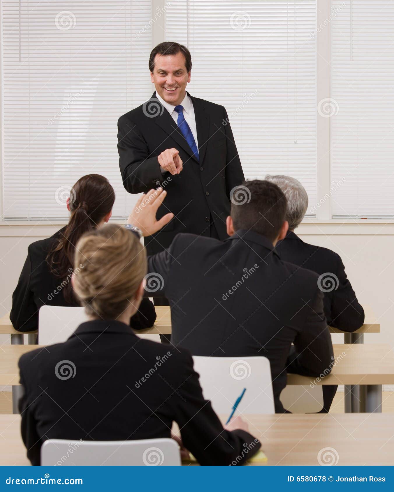 Supervisor Answering Questions from Co-worker Stock Photo - Image of ...