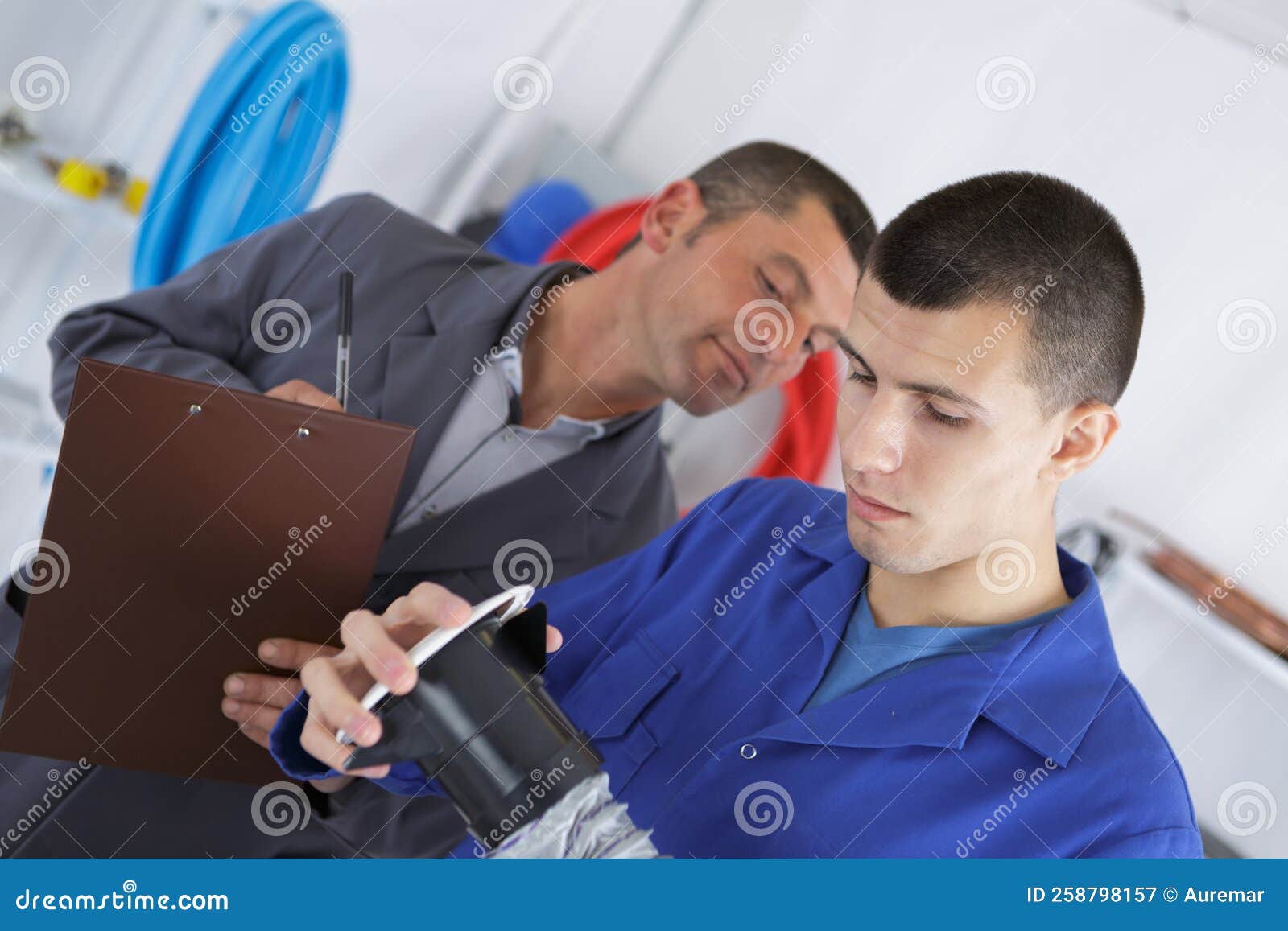 Supervisor Assessing Student Assembling Vetilation System Stock Image ...