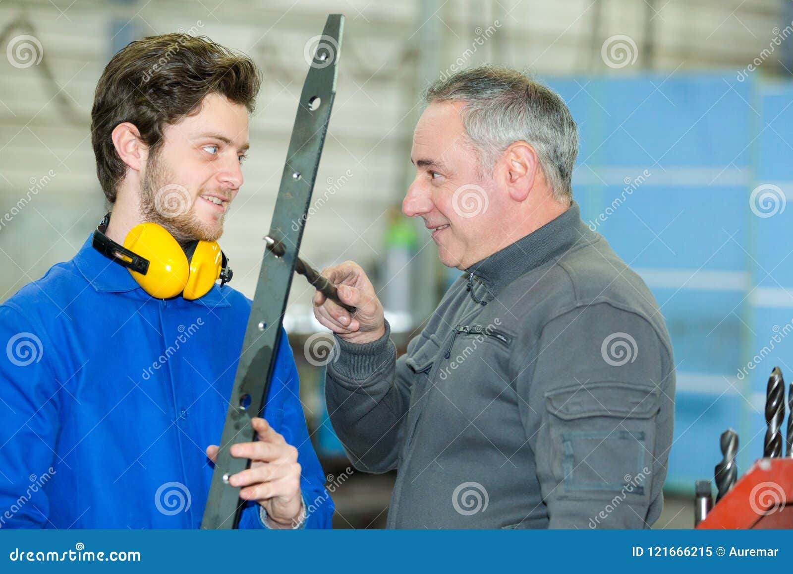 Supervisor Checking Apprentices Work Stock Image - Image of apprentice ...