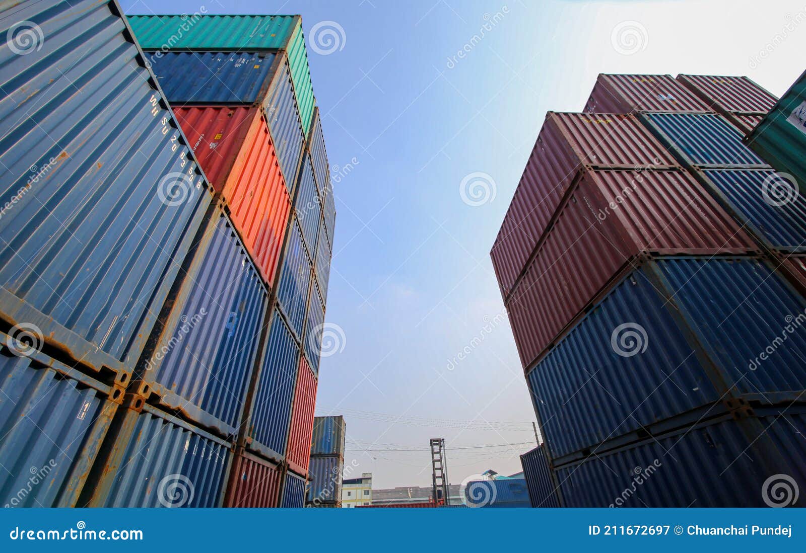 Containers Box from Cargo at Harbor. Foreman Control Industrial ...