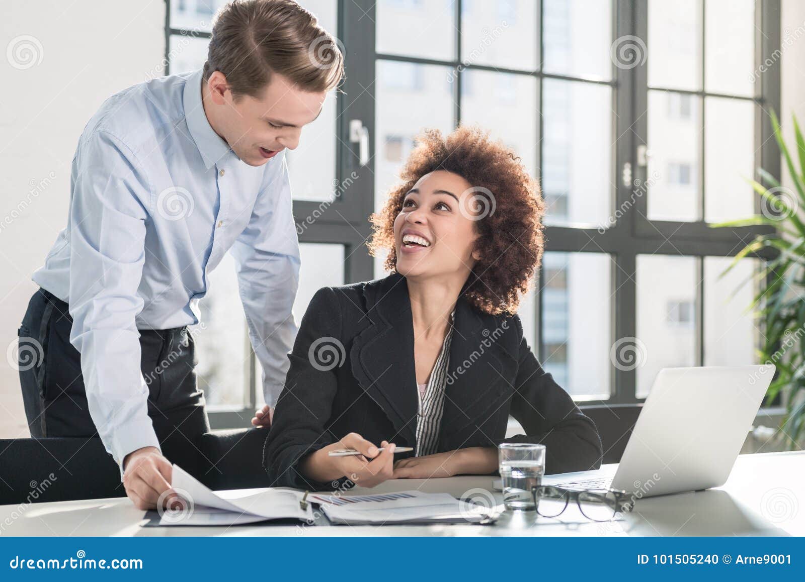 Supervisor Checking Statistics and Explaining the Results Stock Photo ...