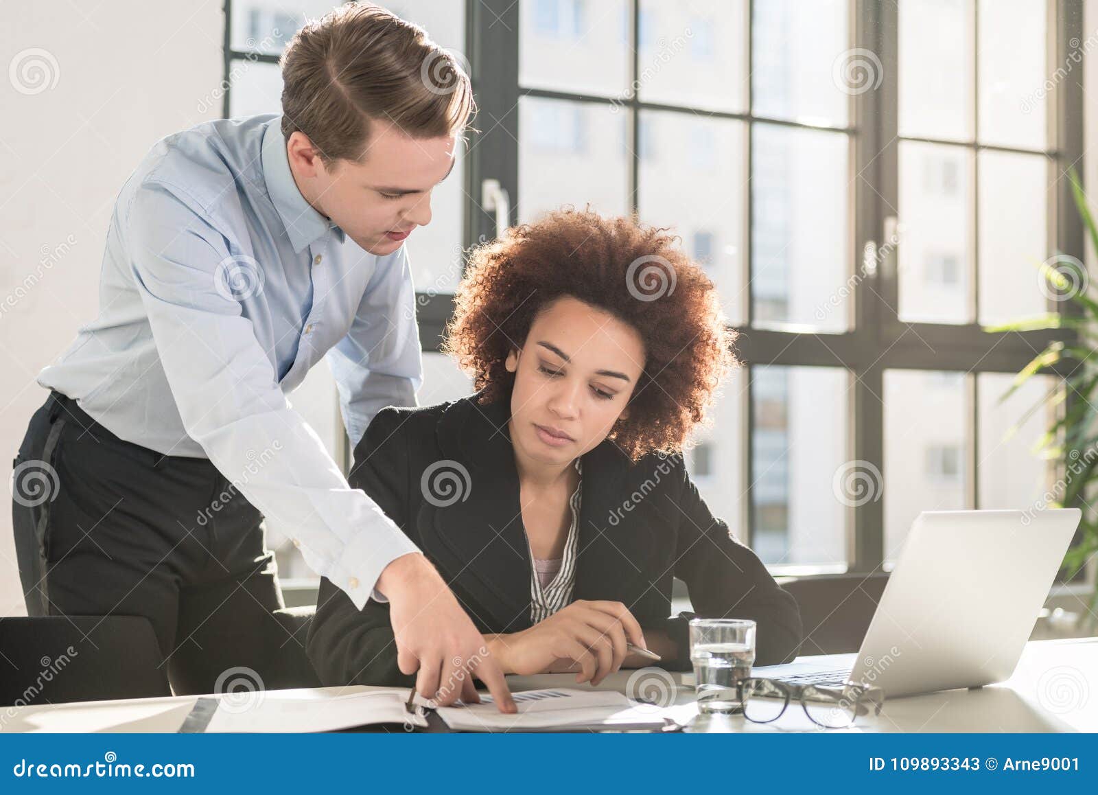 Supervisor Checking Statistics and Explaining the Results Stock Image ...