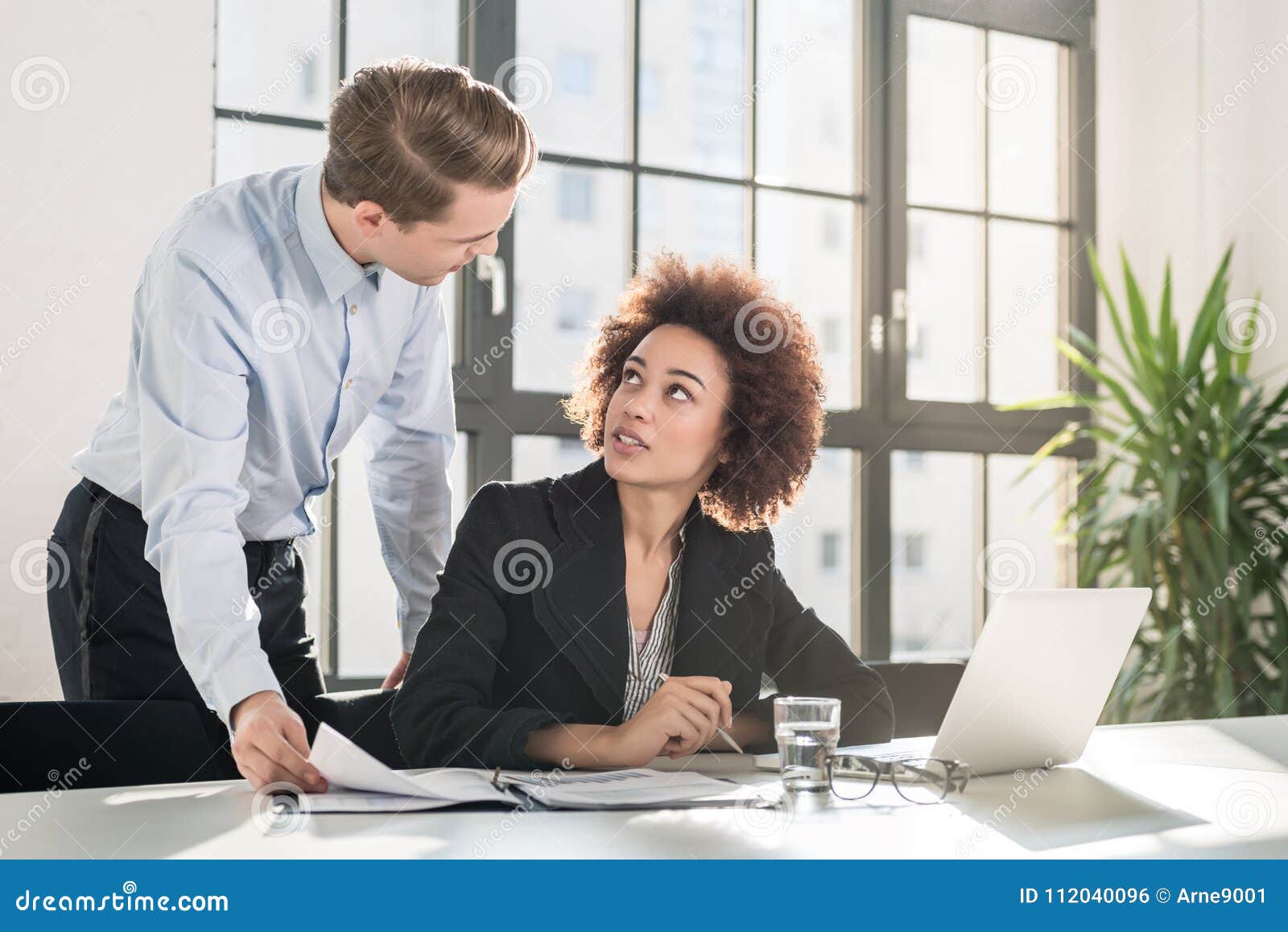 Supervisor Checking Statistics and Explaining the Results Stock Photo ...