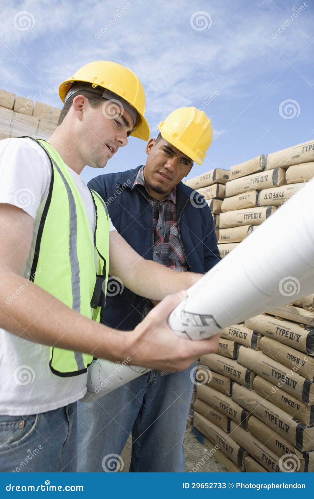 Supervisor and Co-Worker with Blueprint Stock Image - Image of male ...