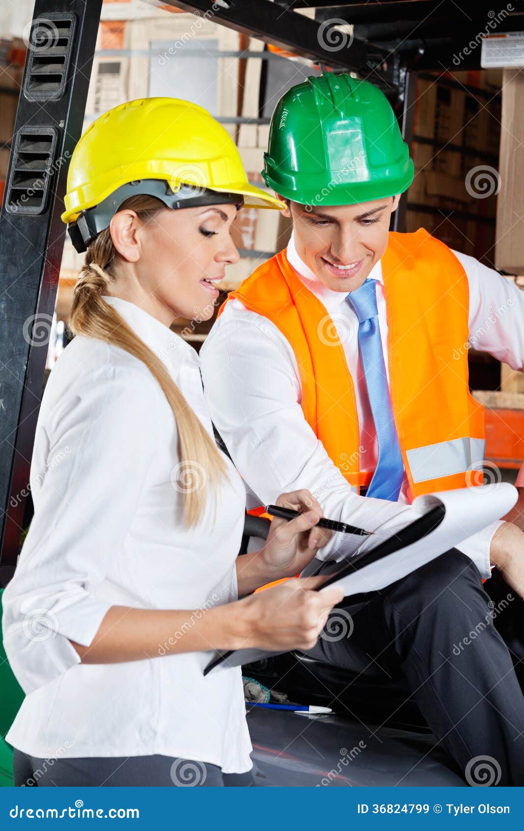 Supervisor Communicating with Colleague at Stock Image - Image of depot ...