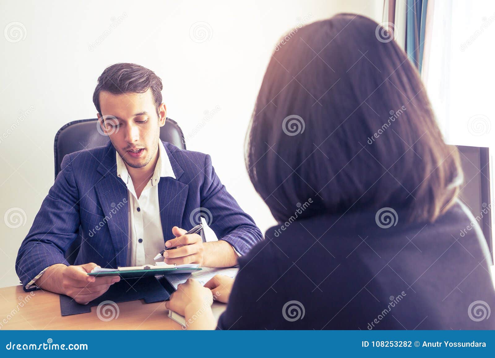 Supervisor Explaining Documents Contractto a Female Worker Stock Photo ... Supervisor Explaining Documents Contractto a Female Worker Stock Photo ...