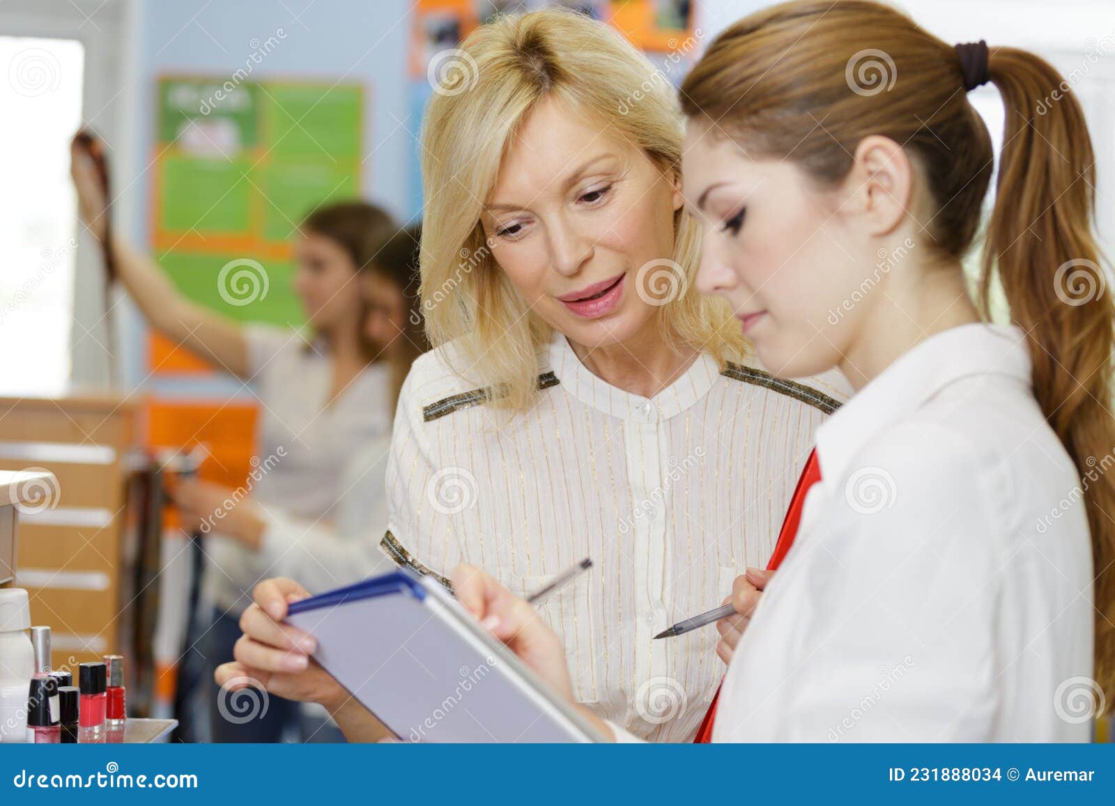 Supervisor with Female Student Stock Photo - Image of teaching, blond ...
