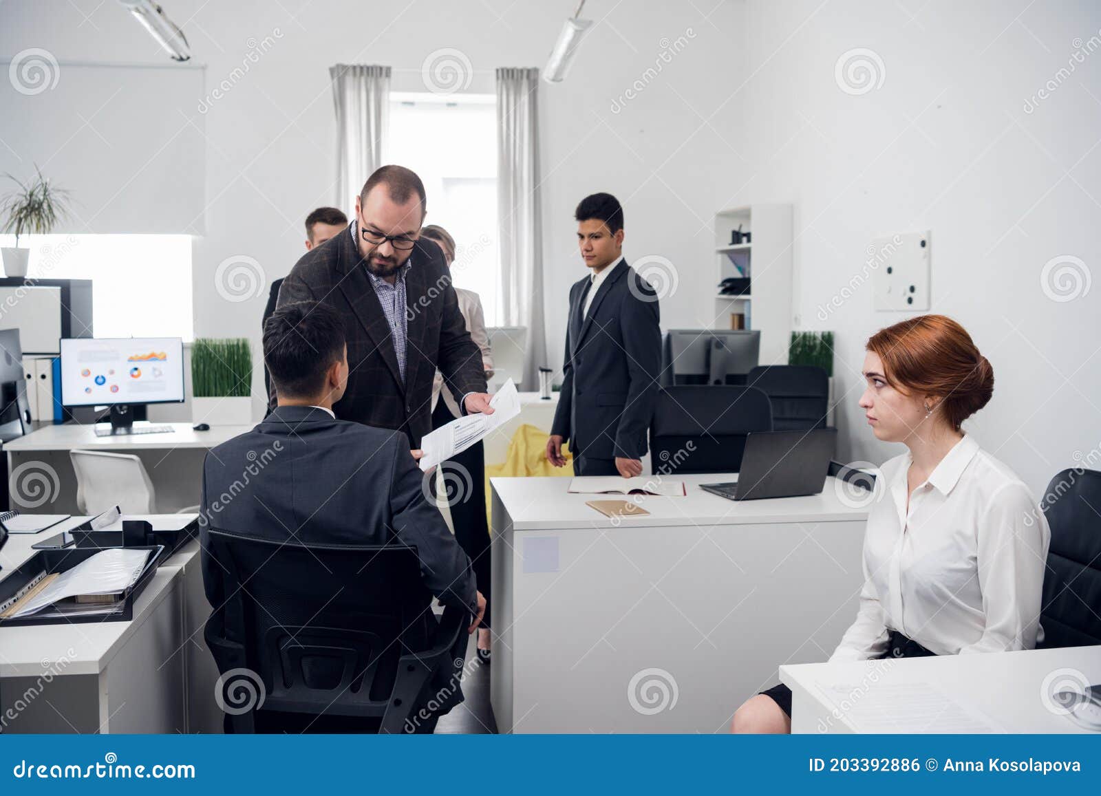 The Supervisor Inspects the Work of Junior Managers in the Office of an ...