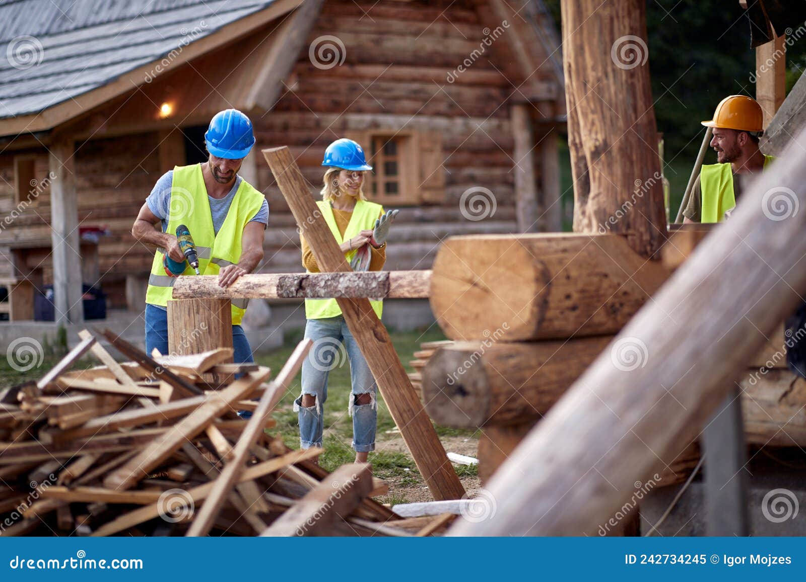 Supervisor Interacting with Male Workers. Young Cheerful Construction ...