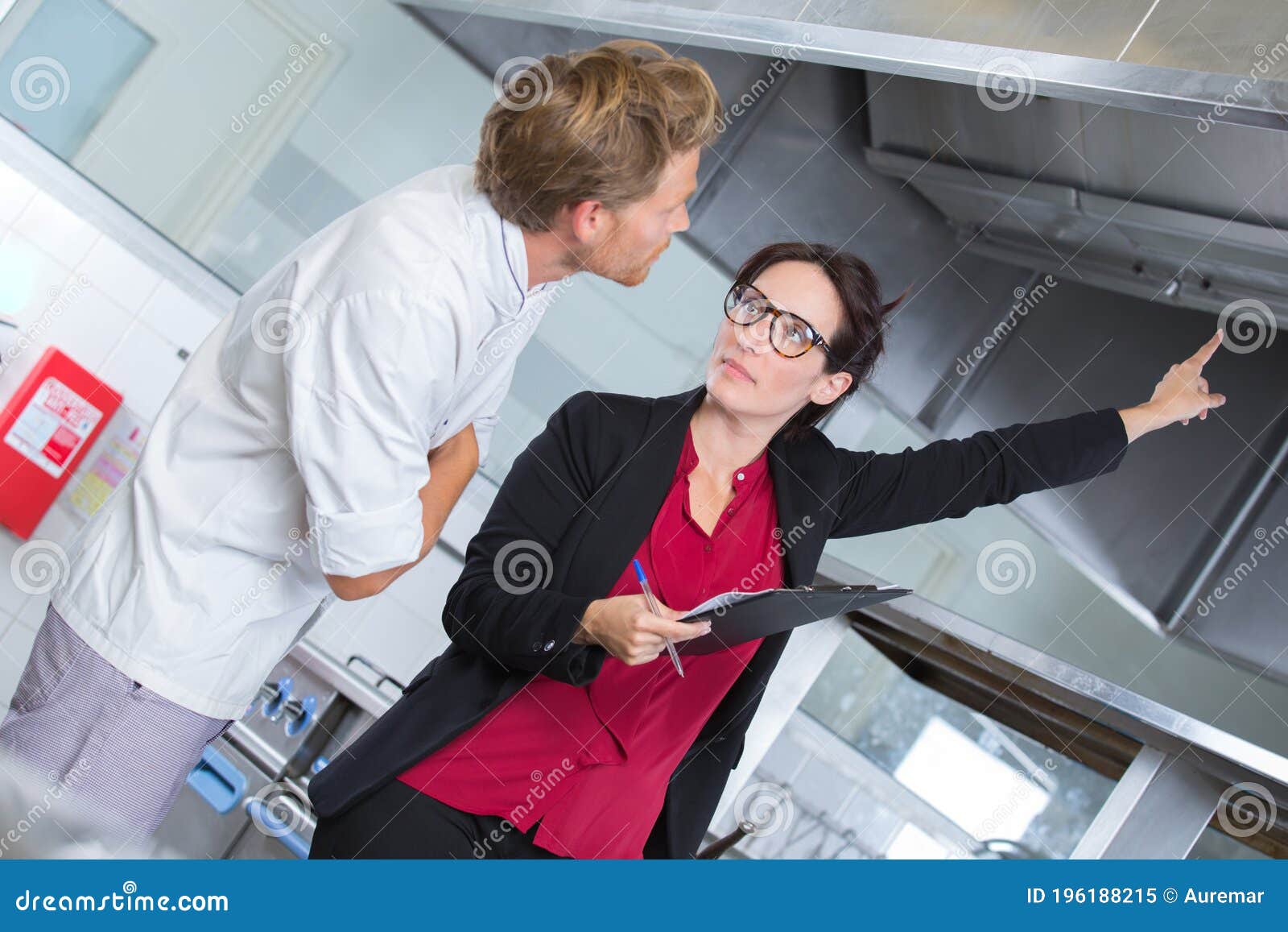 Supervisor Pointing at Problem in Kitchen Stock Image - Image of ...