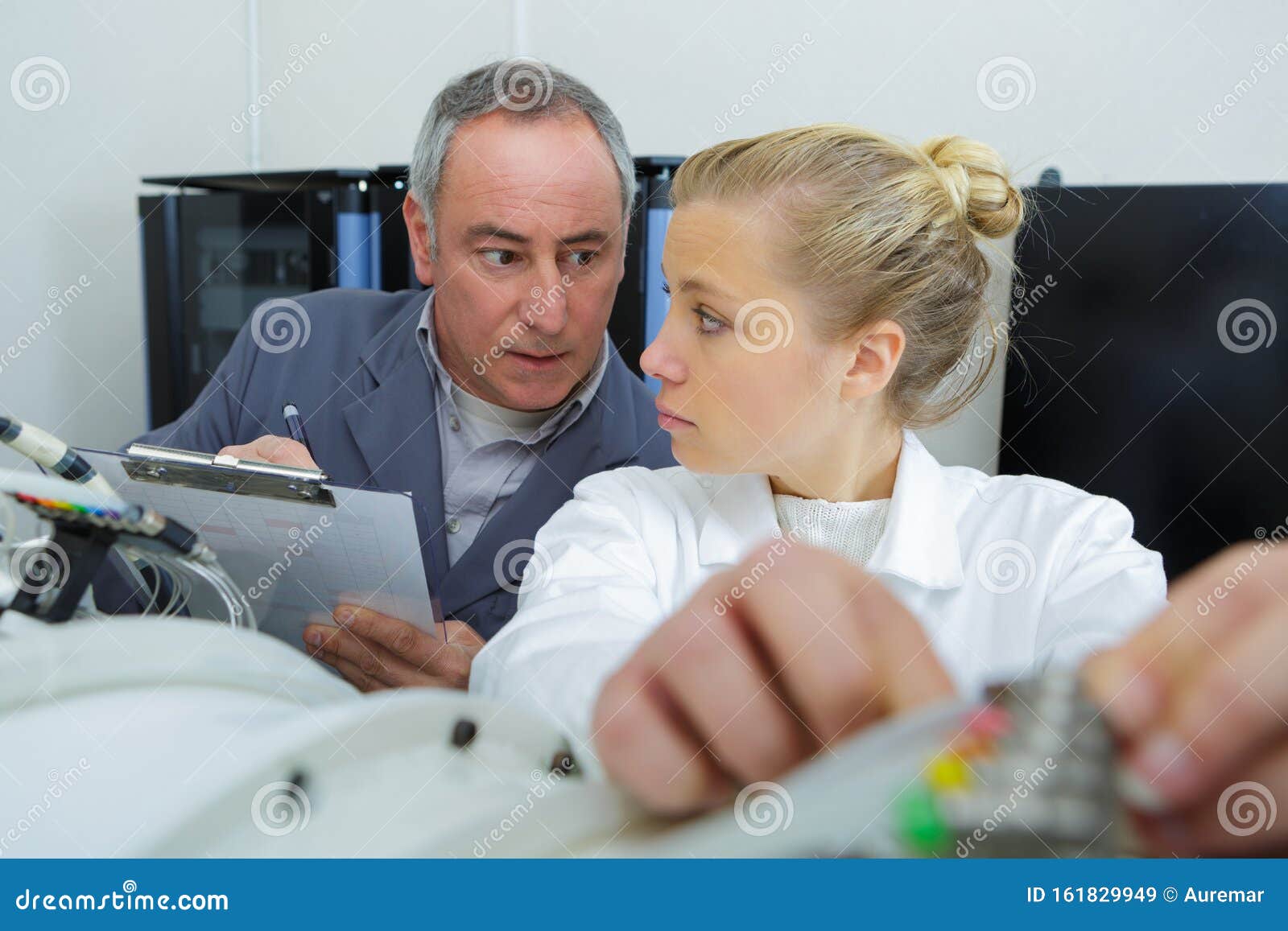 Supervisor Questioning Young Apprentices Work Stock Image - Image of ...