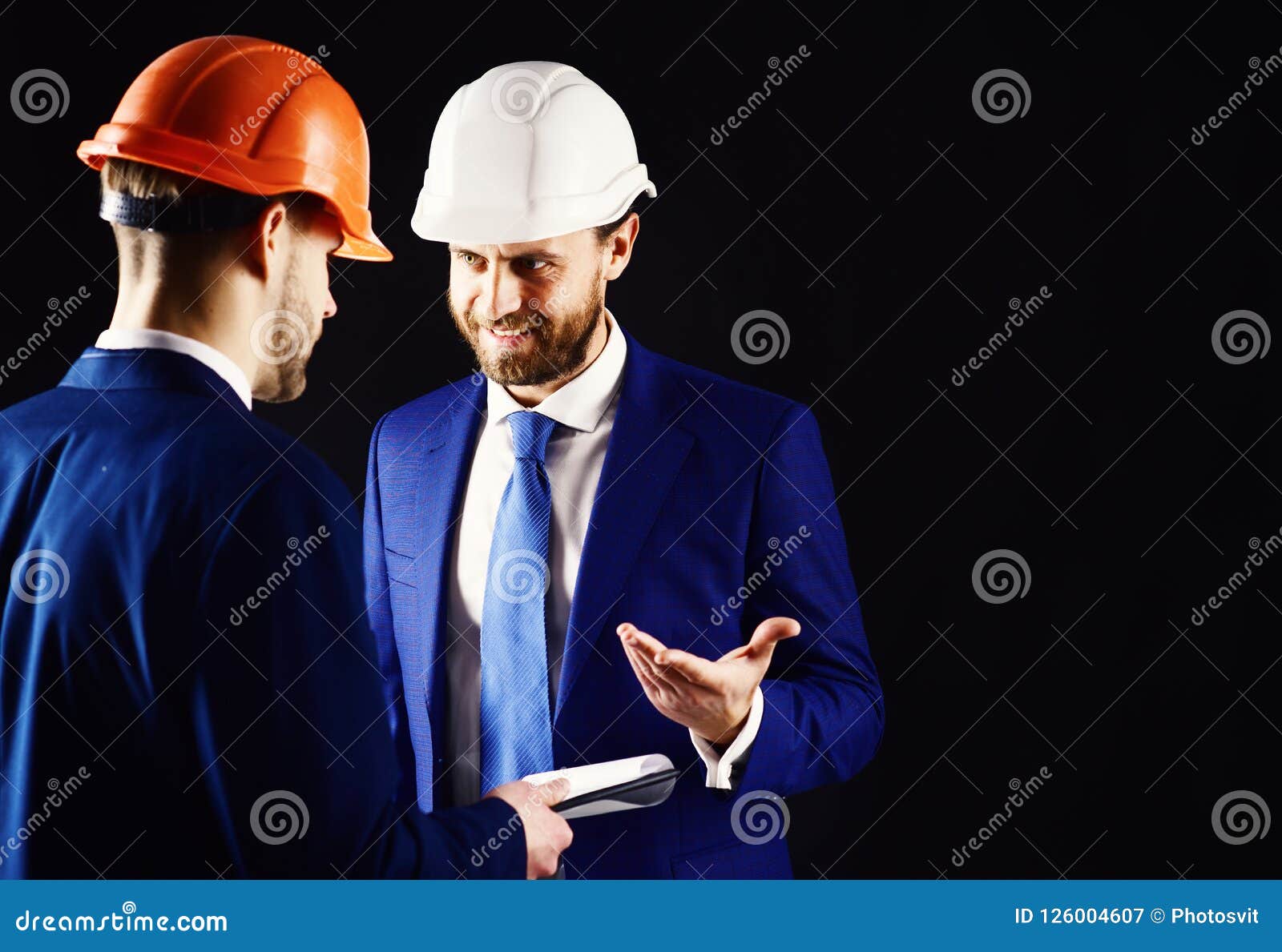 Supervisor and Technician in Helmets. Building Inspector with Smiling ...