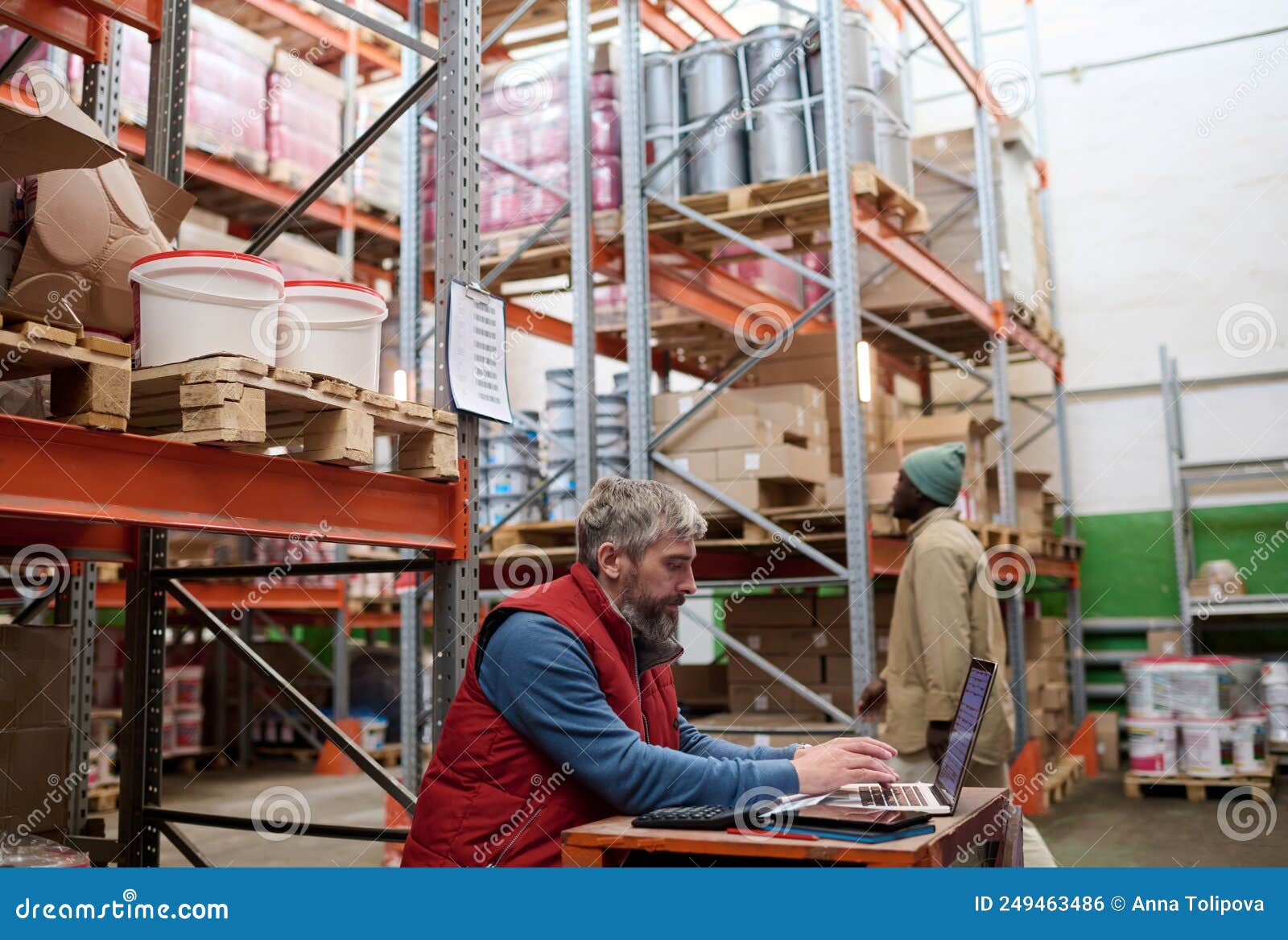 Supervisor Working on Laptop at Warehouse Stock Photo - Image of shelf ...