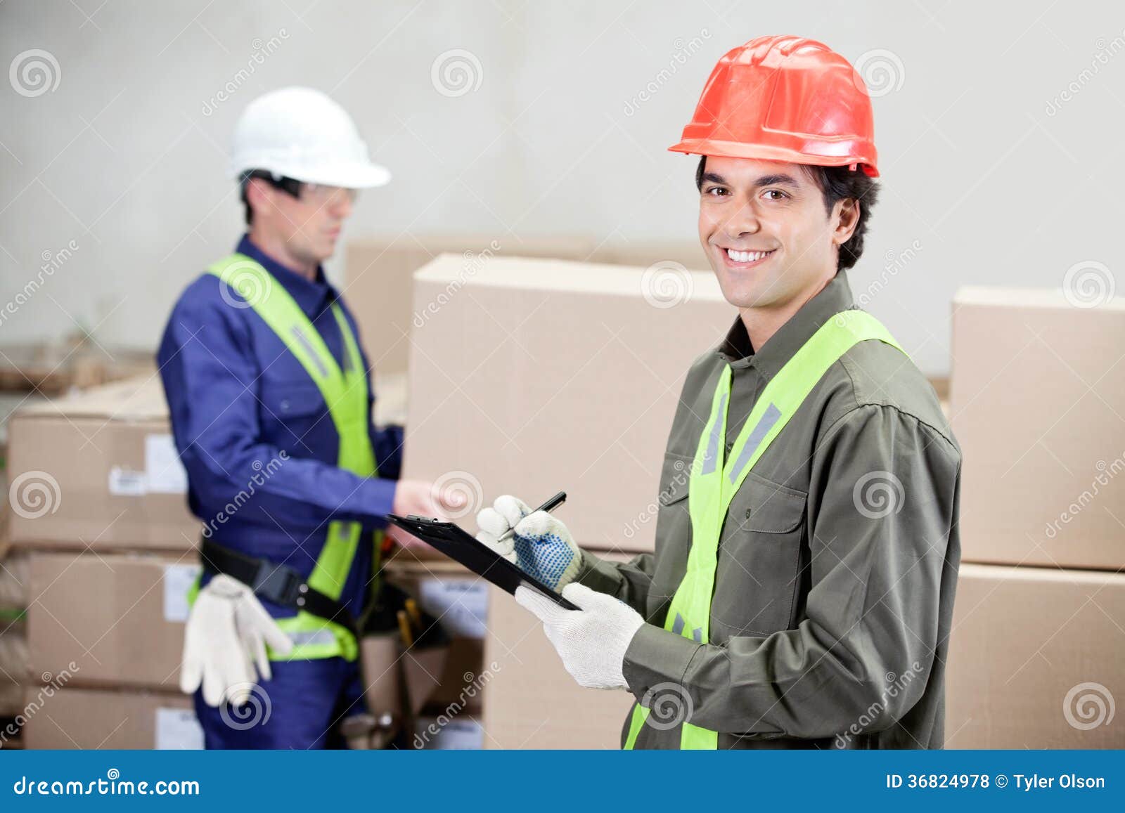 Supervisor Writing Notes Clipboard while Foreman Stock Photo - Image of ...