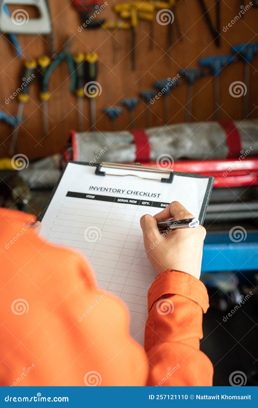 Perform Inventory Checklist in Factory Warehouse. Stock Photo - Image ...