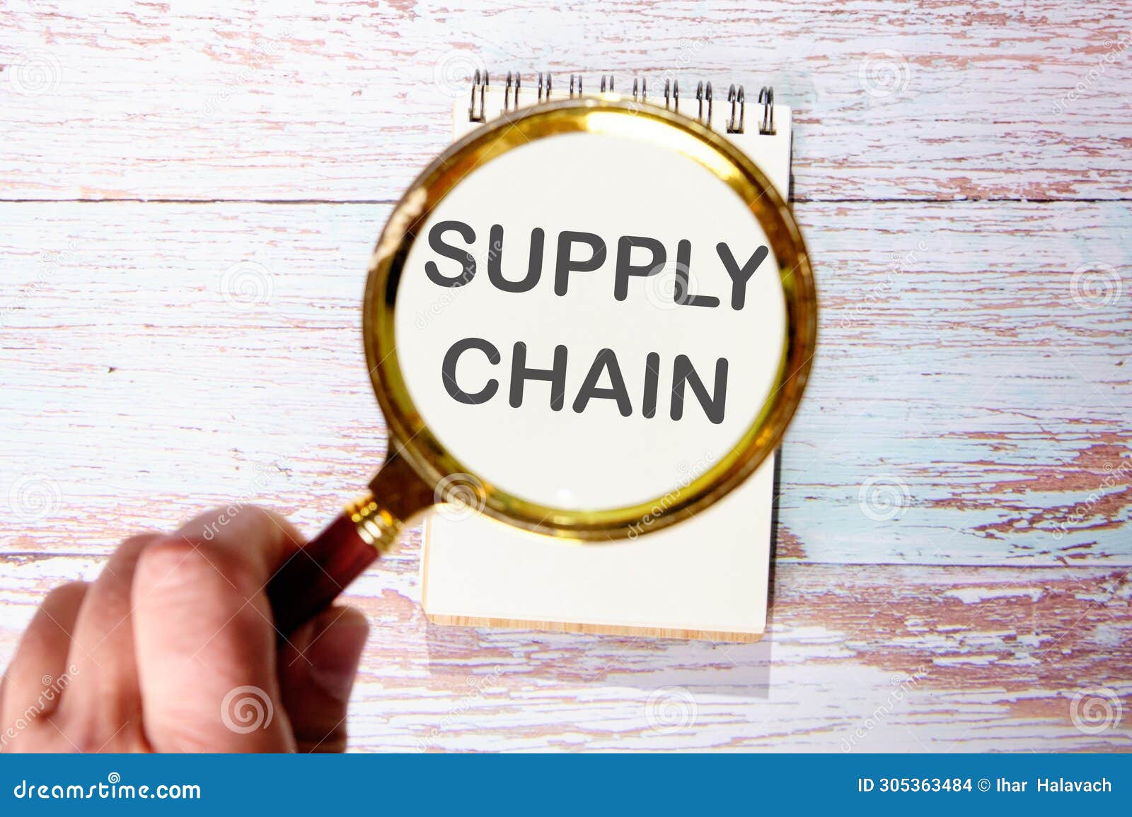 SUPPLY CHAIN Text Seen through Magnifying Glasses on a Notepad Stock ...