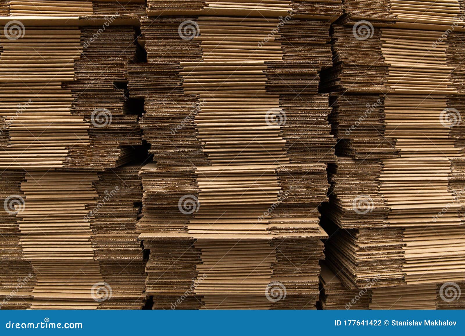 Supply of Unassembled Cardboard Boxes in the Warehouse. Stack of ...