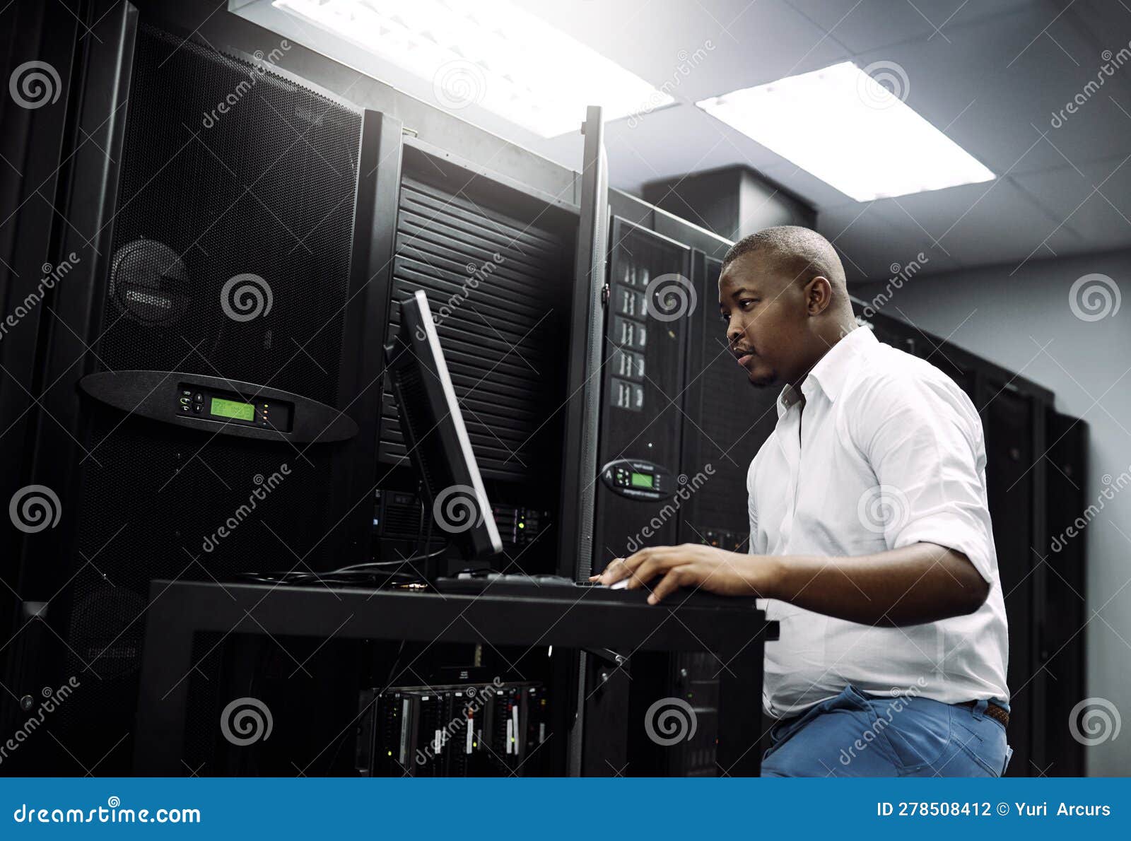 It Support, Black Man or Coding on Laptop in Server Room for Big Data ...