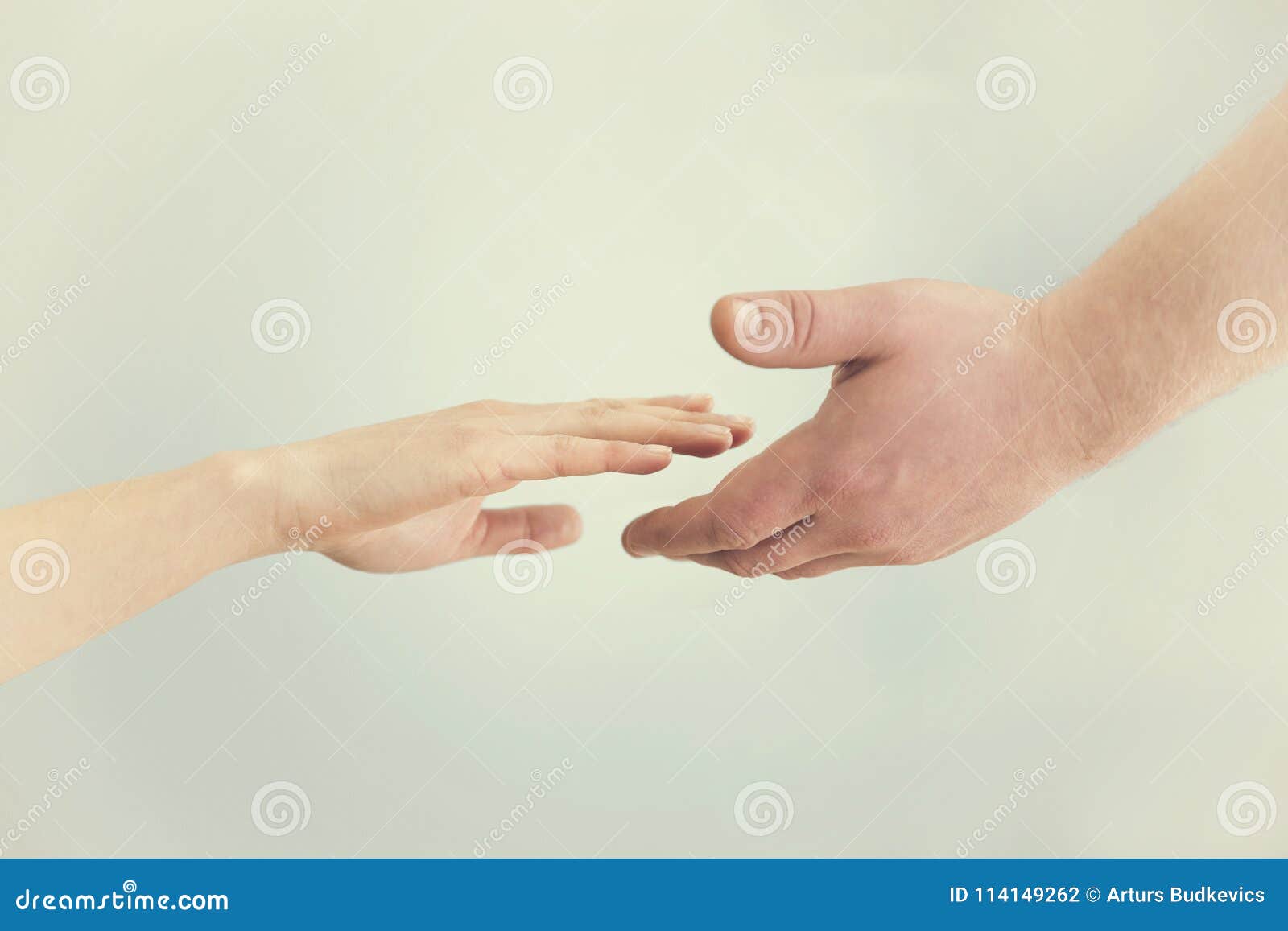 Support Concept. Two Hands Reaching Toward Each Other Stock Photo ...
